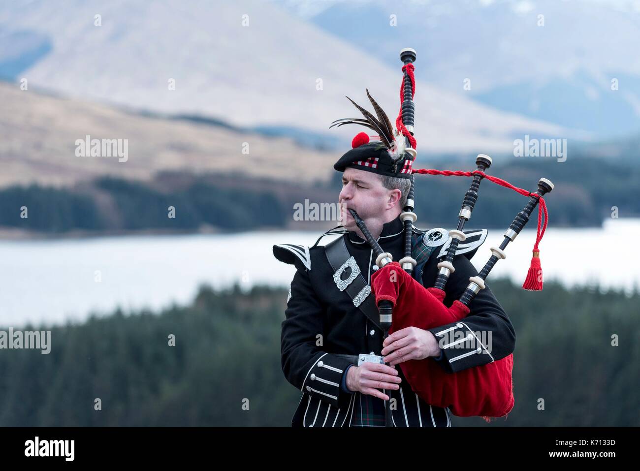 Scotland, Highland, bagpipes in front of a Highland landscape Stock ...