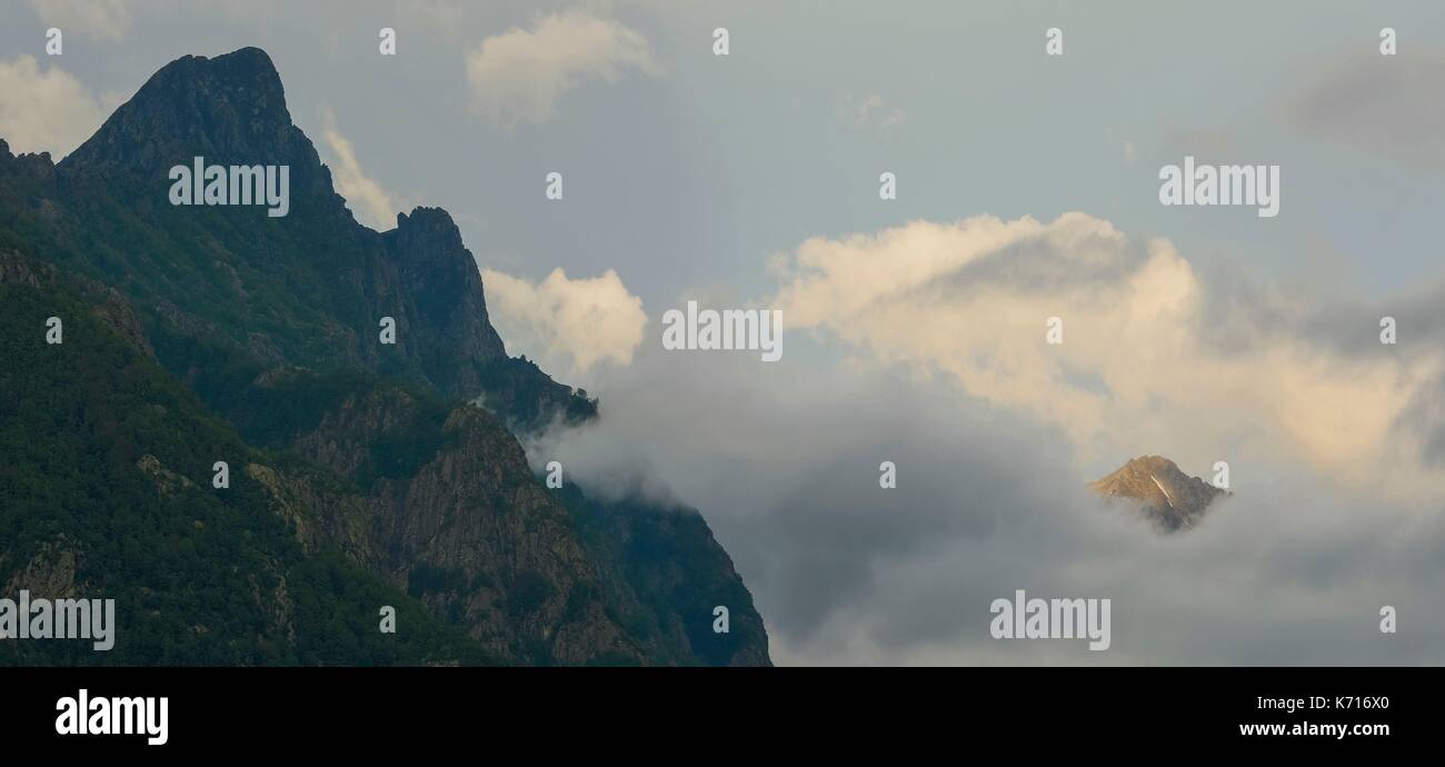 France, Ariege, Orlu, Orlu Nature Reserve, mountain in the mist Stock ...