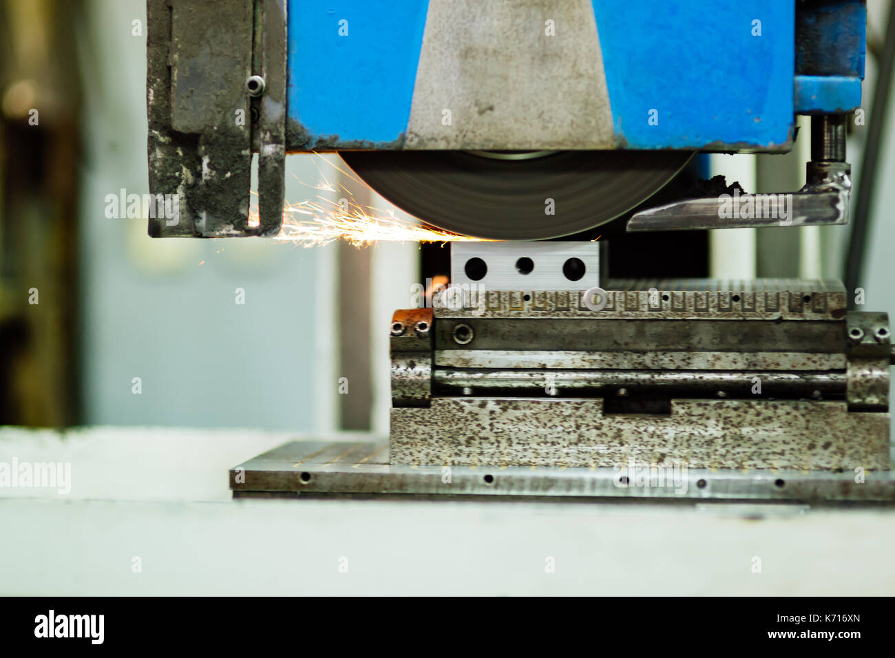 Polishing surface of metal in factory Stock Photo - Alamy