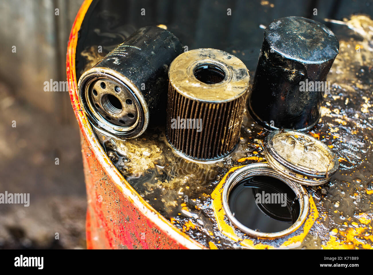 Used oil filters for low depth of field Stock Photo - Alamy