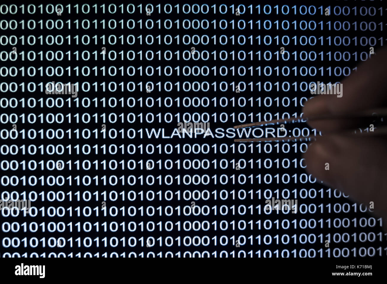 Binary code, Hacker with tweezers finds wireless password Stock Photo ...