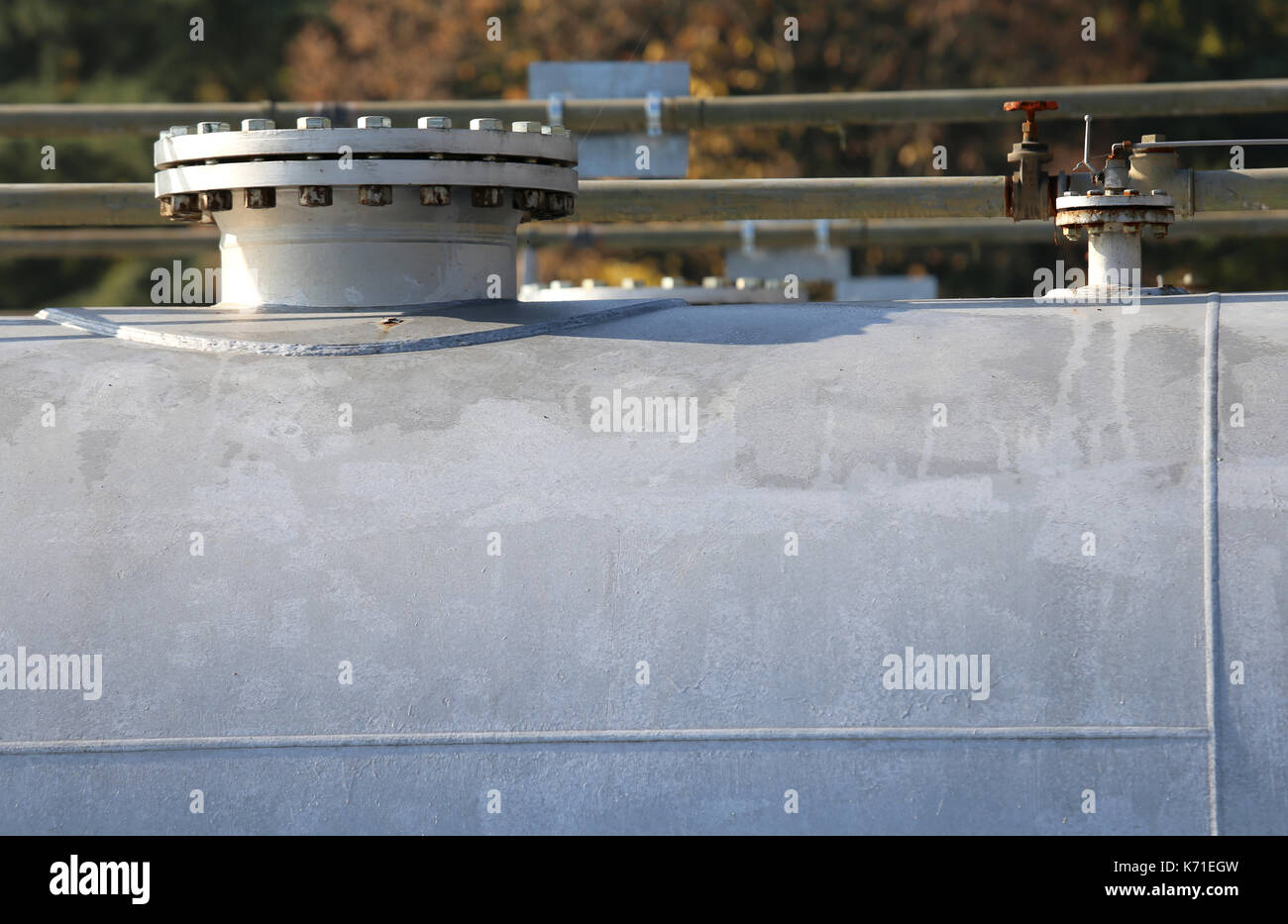 cover with bolts over big tank to contain methane gas in an industrial ...
