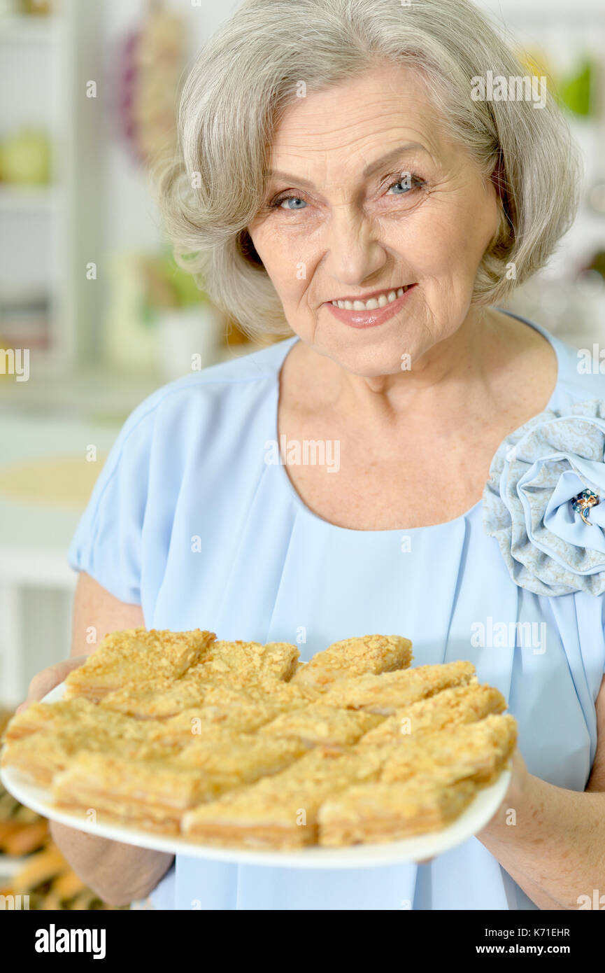 Woman old eating cookies hi-res stock photography and images - Alamy