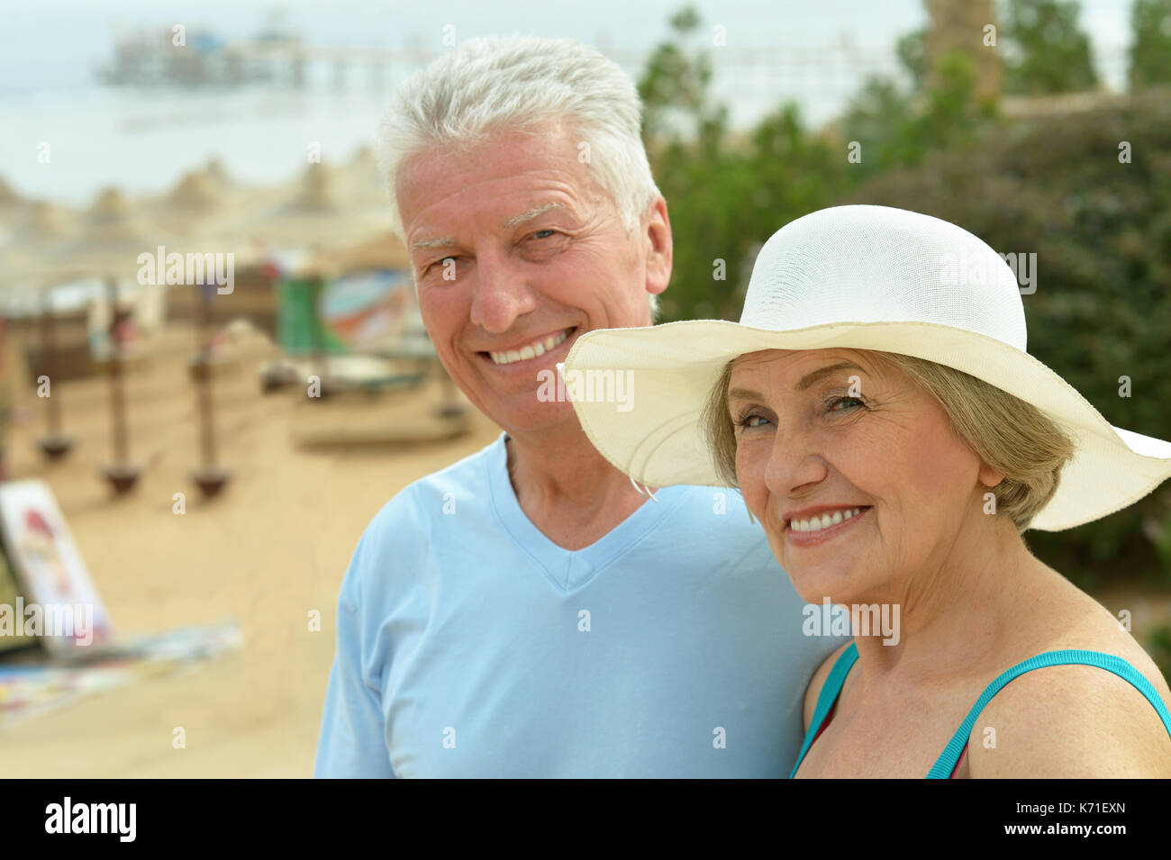 couple posing at resort Stock Photo - Alamy