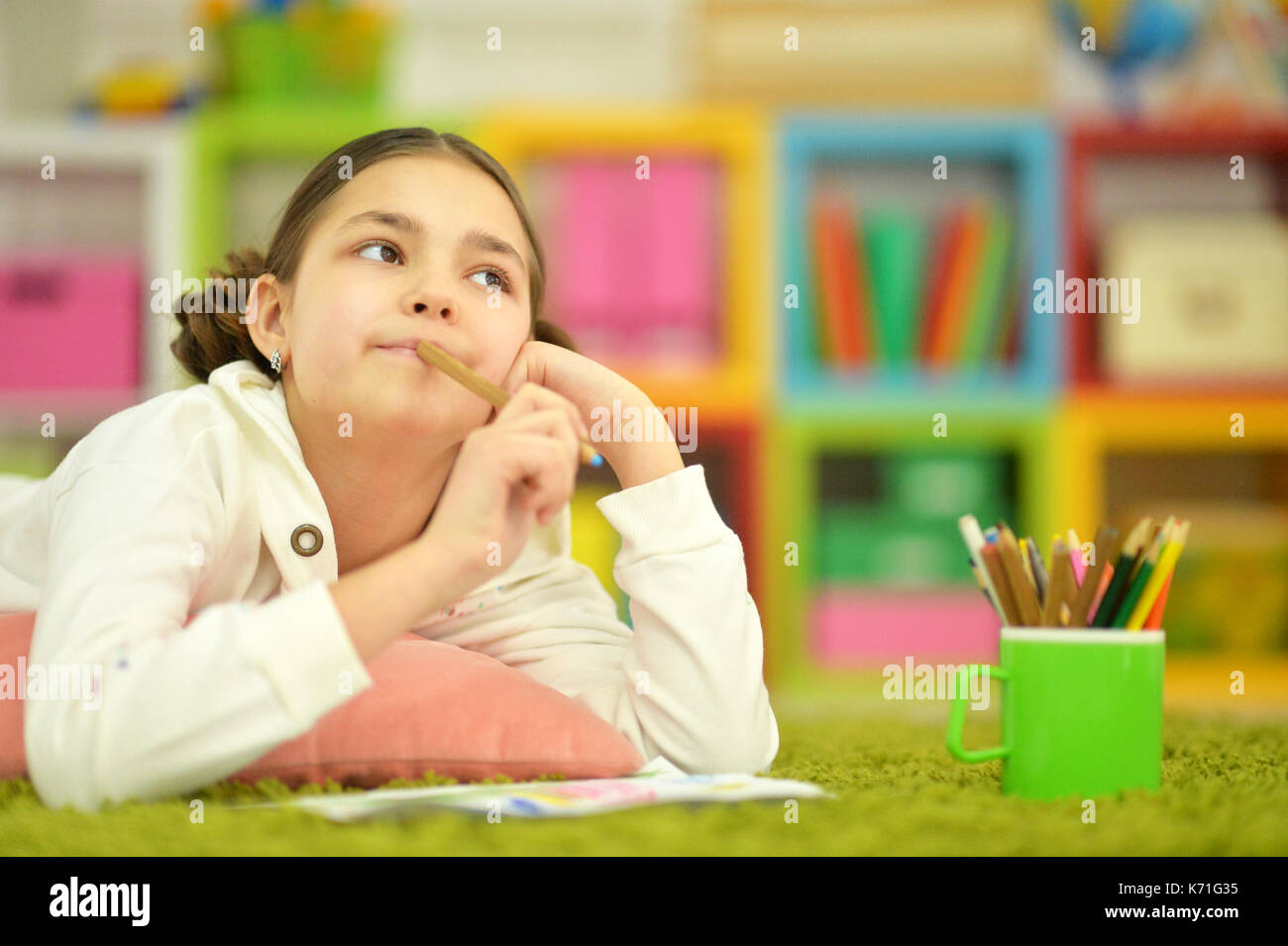 Thoughtful teen girl Stock Photo - Alamy