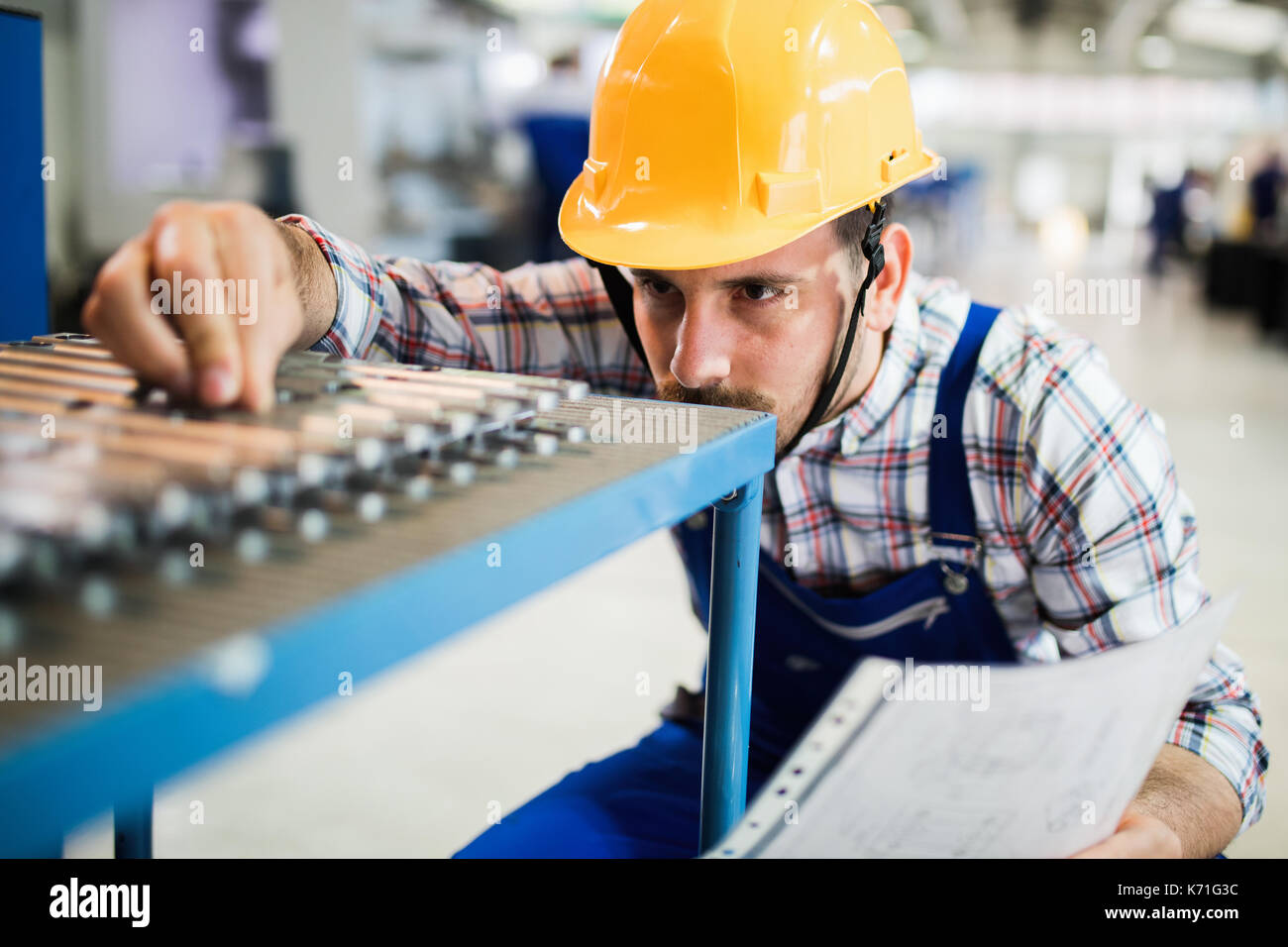 Supervisor doing quality control and pruduction check in factory Stock ...