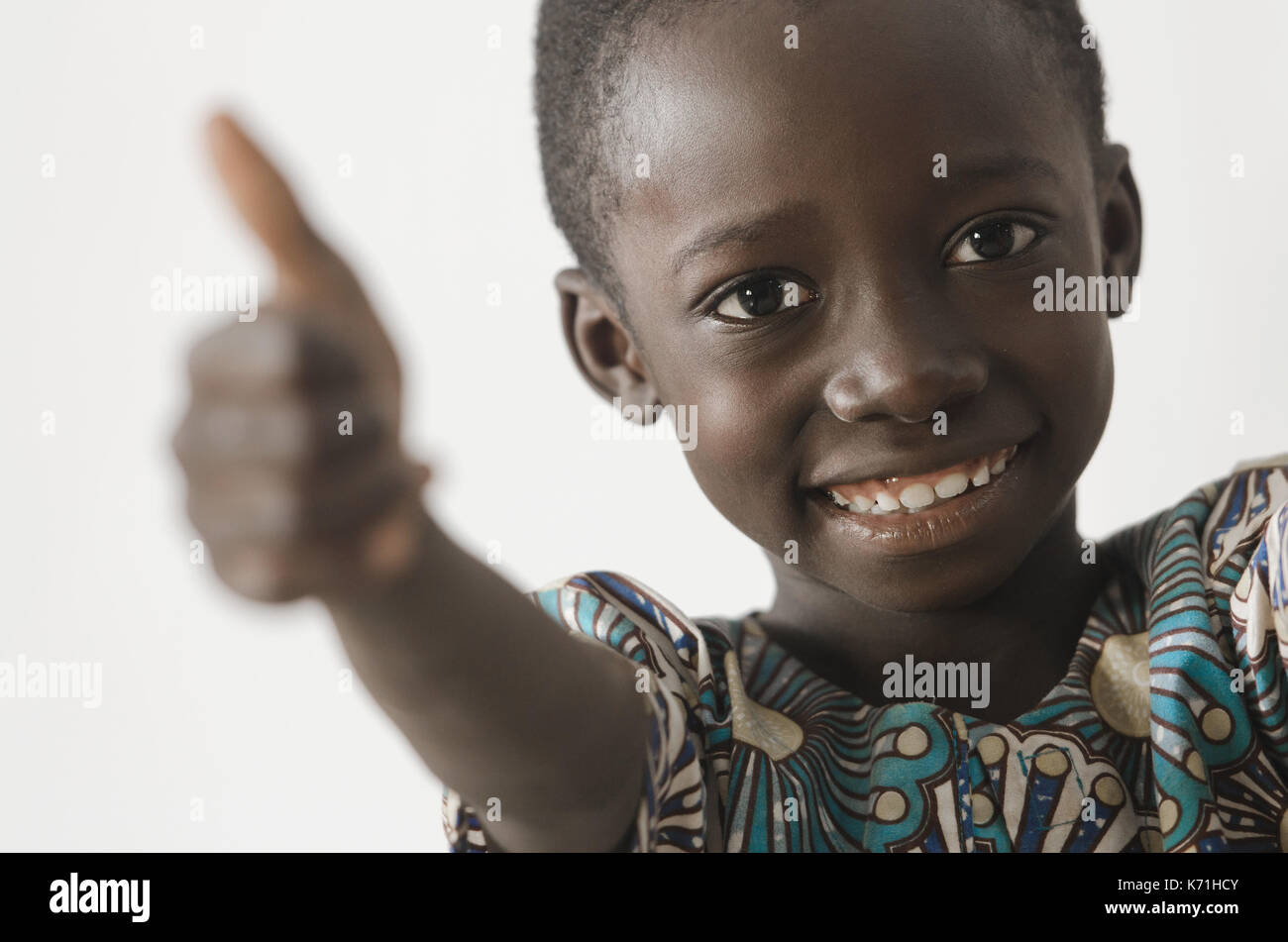 School children showing thumbs up hi-res stock photography and images ...