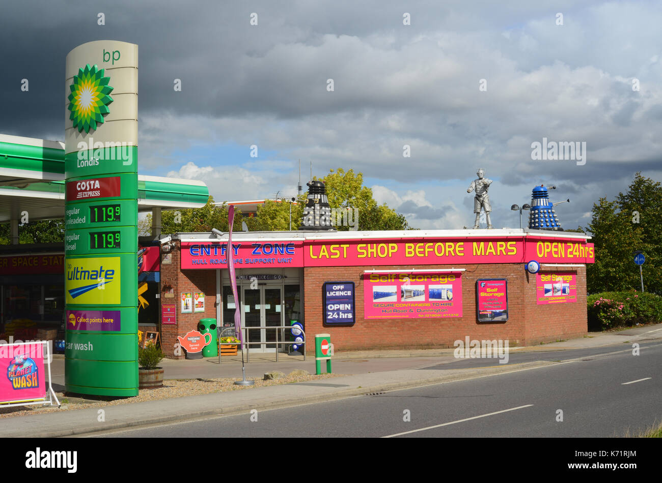 funny sign last shop before mars at roadside garage with daleks and ...