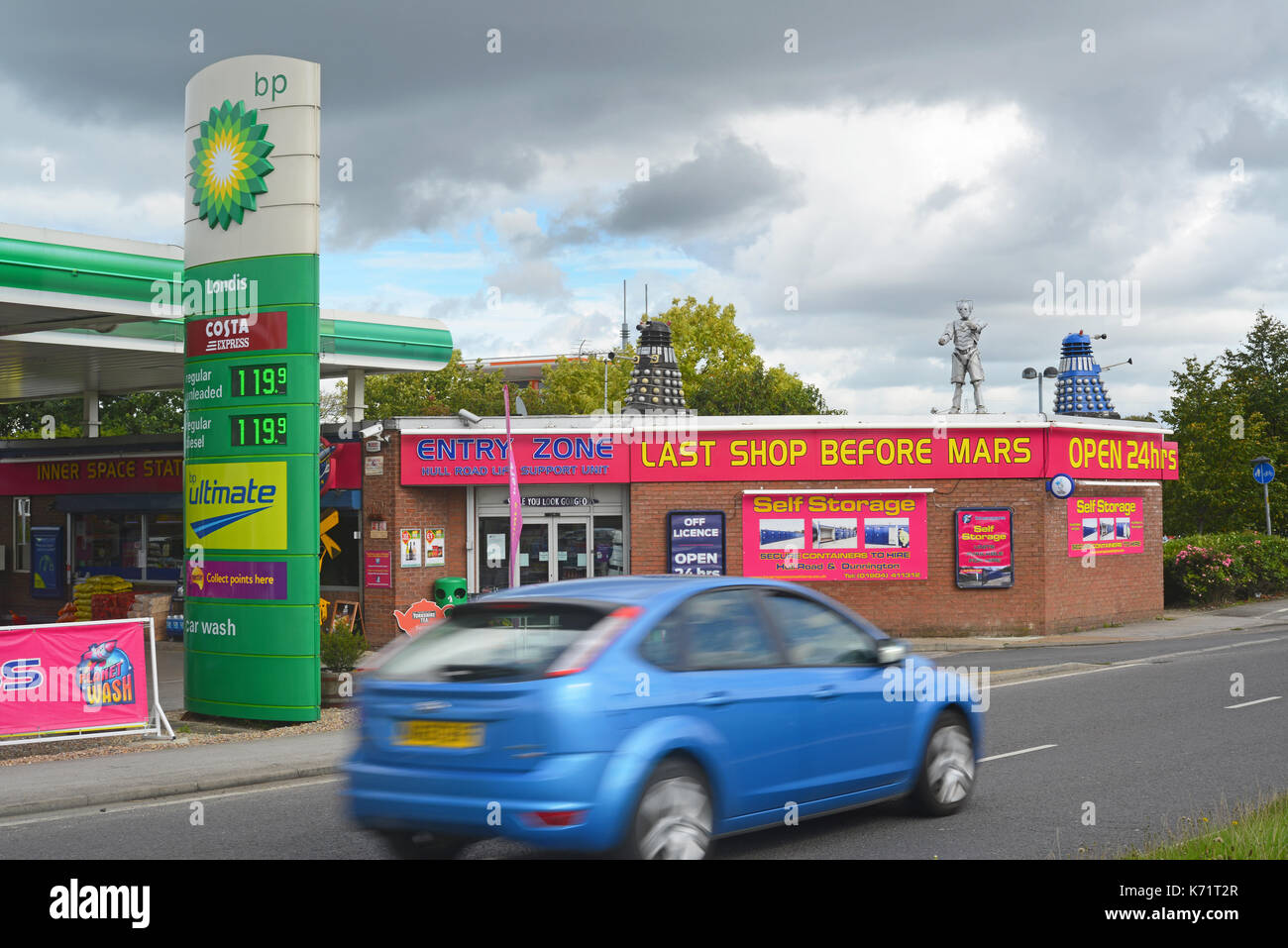 funny sign last shop before mars at roadside garage with daleks and ...