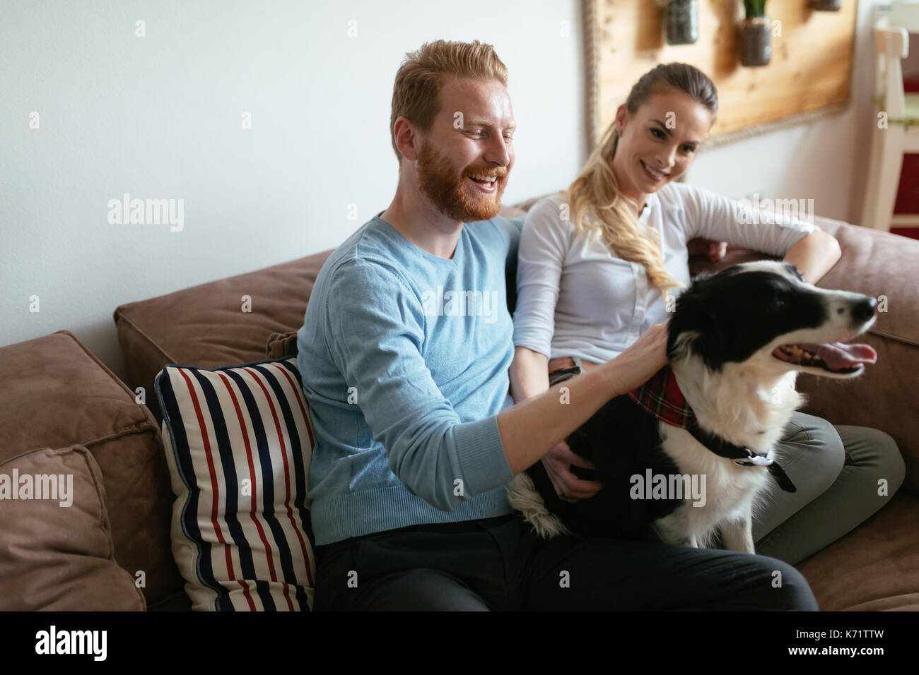 Man relaxing with pet hi-res stock photography and images - Alamy