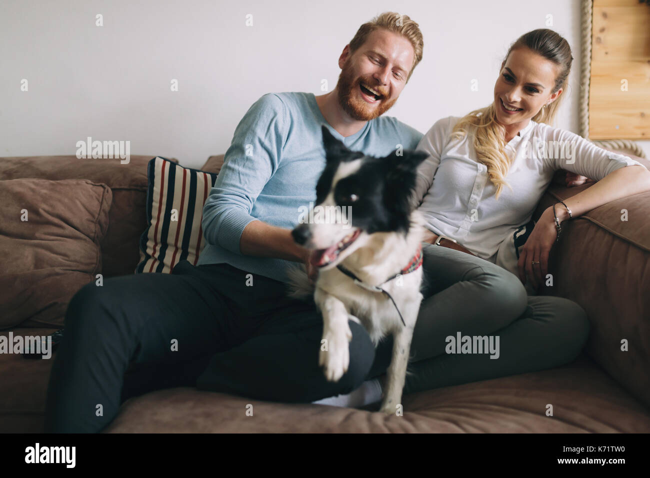 Man relaxing at home with dog hi-res stock photography and images - Alamy