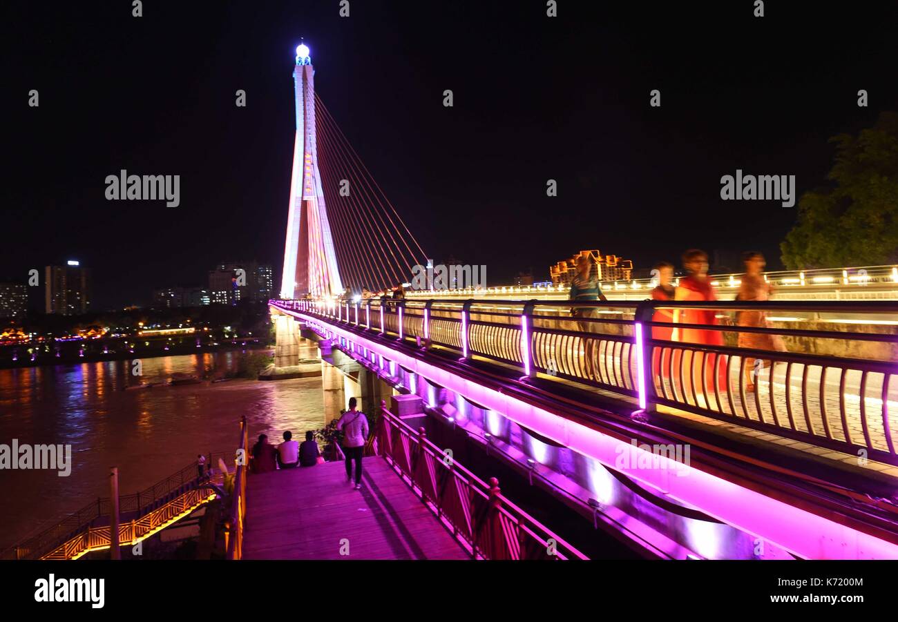 Jinghong, China's Yunnan Province. 13th Sep, 2017. People enjoy night ...