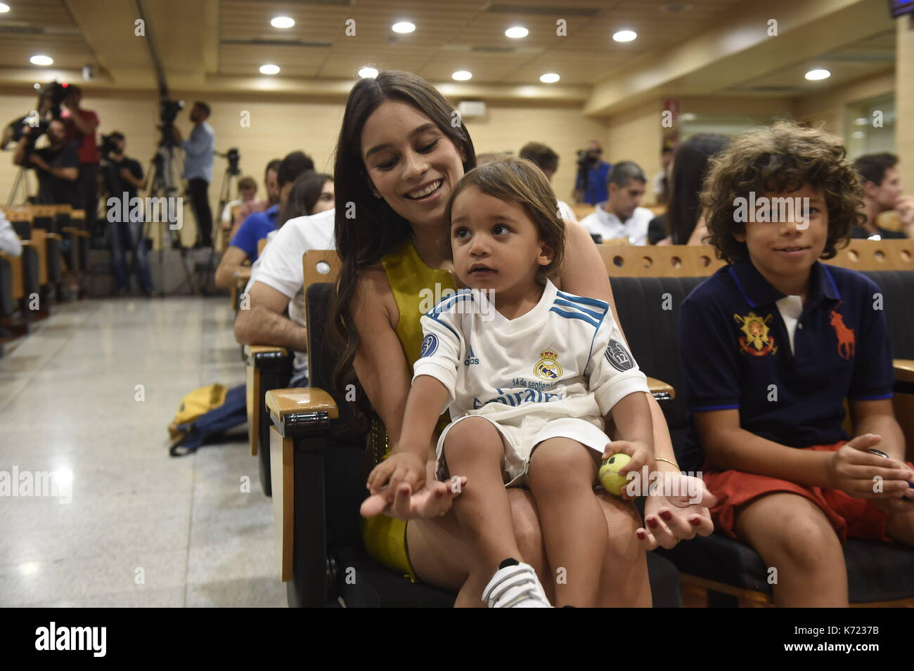 Clarice Alves and sons Enzo,Liam during act of presentation of ...