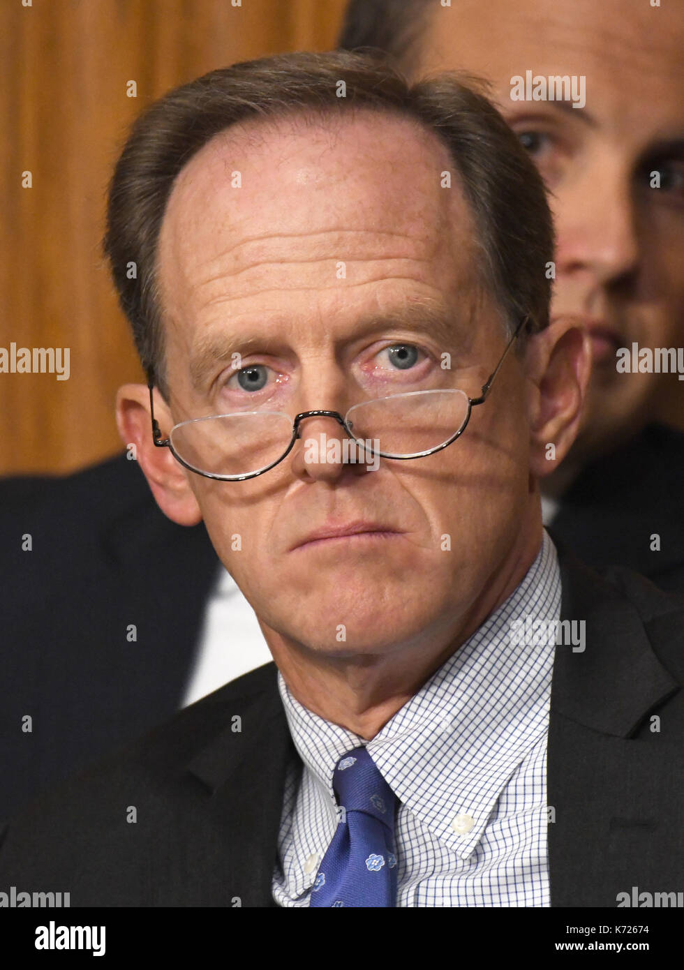 United States Senator Pat Toomey (Republican of Pennsylvania) listens ...