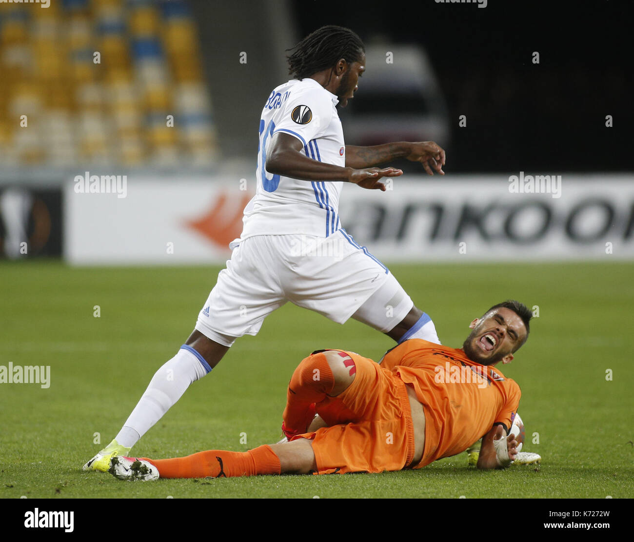September 14, 2017 - Dieumerci Mbokani (L ) of Dynamo vies for the ball ...