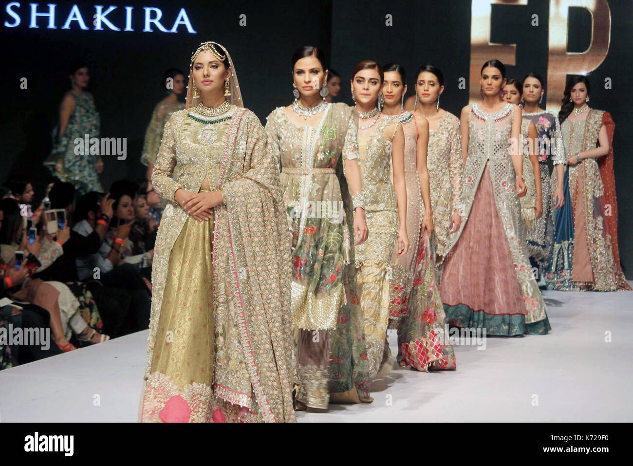 Karachi, Pakistan. 14th Sep, 2017. Models present creations on the last ...