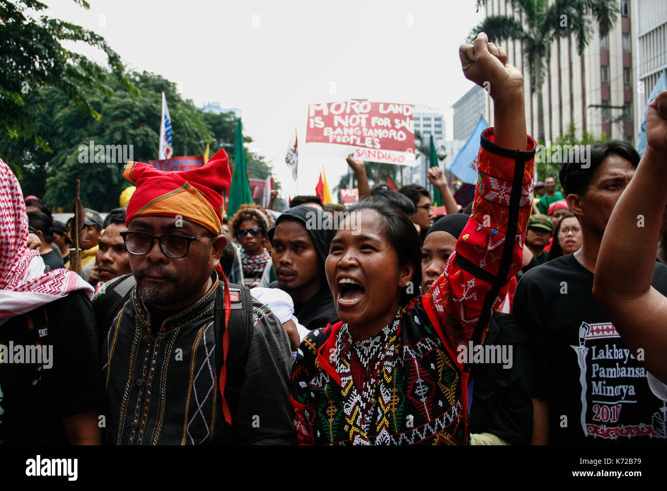 Manila, Philippines. 15th Sep, 2017. Protesters chant slogans as they ...