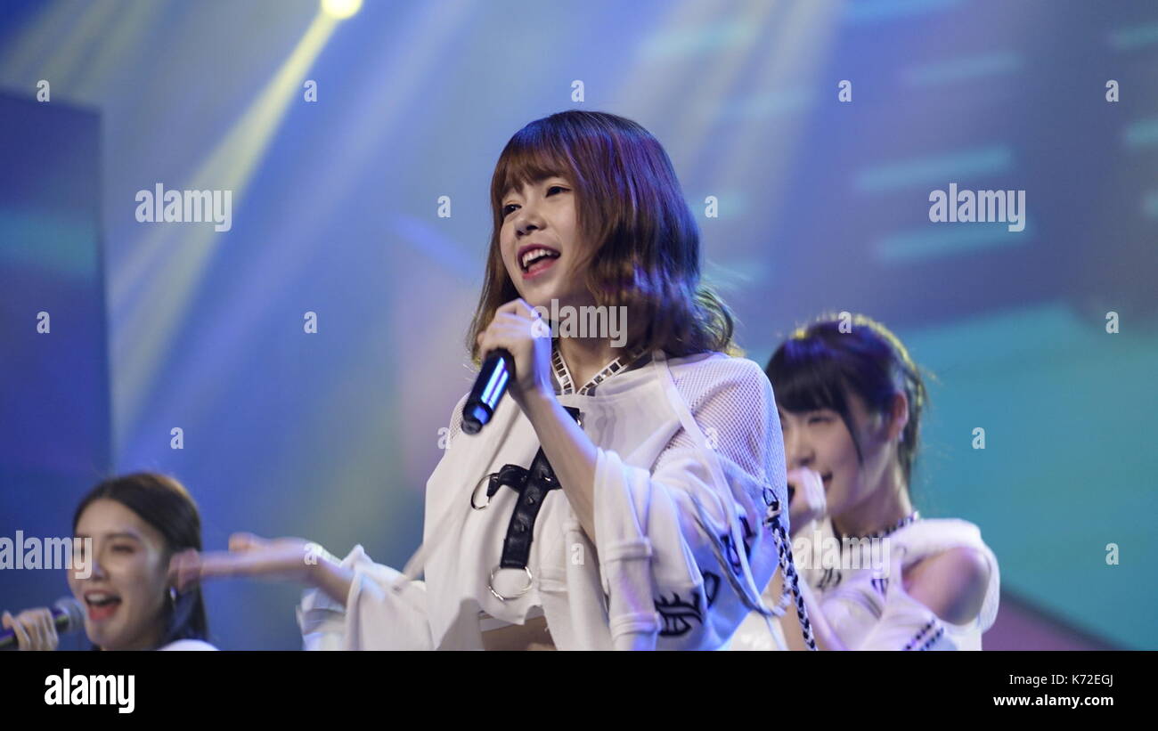 Members of Chinese girl group SNH48 perform during the 10th anniversary ...