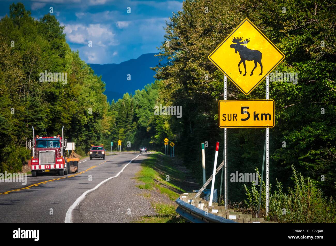 Log truck crossing hi-res stock photography and images - Alamy