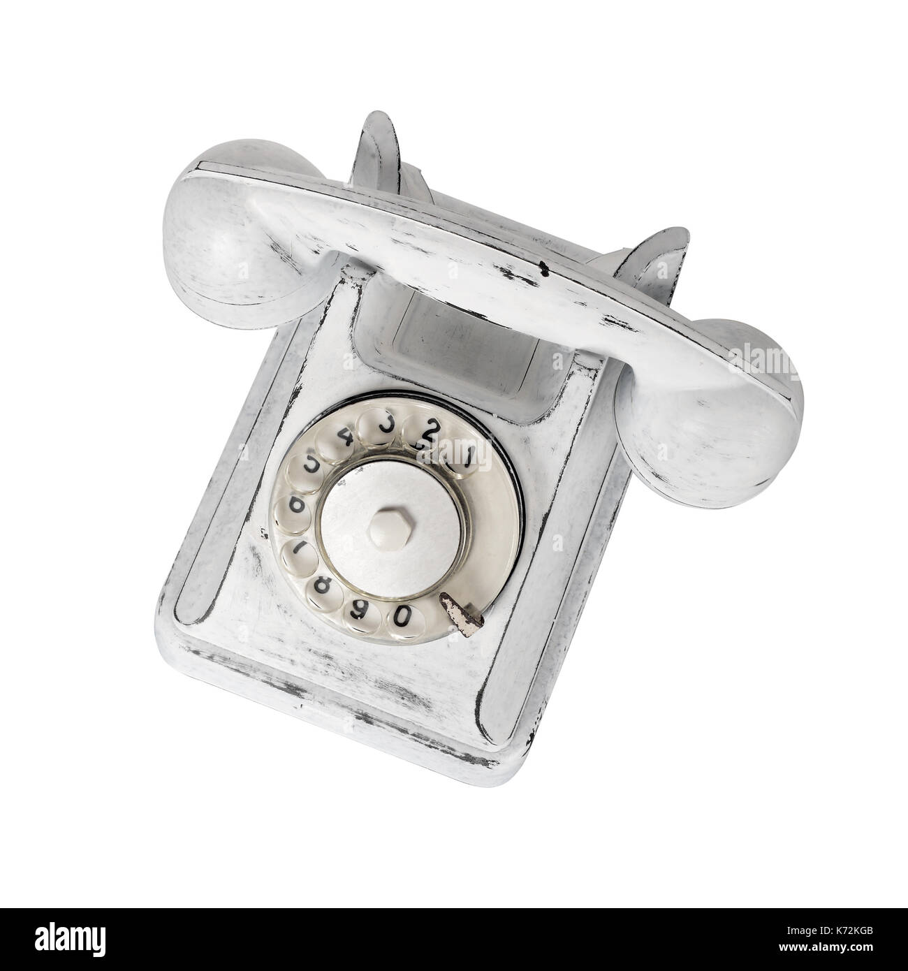 Peel white vintage phone on a white background. It is isolated, the ...