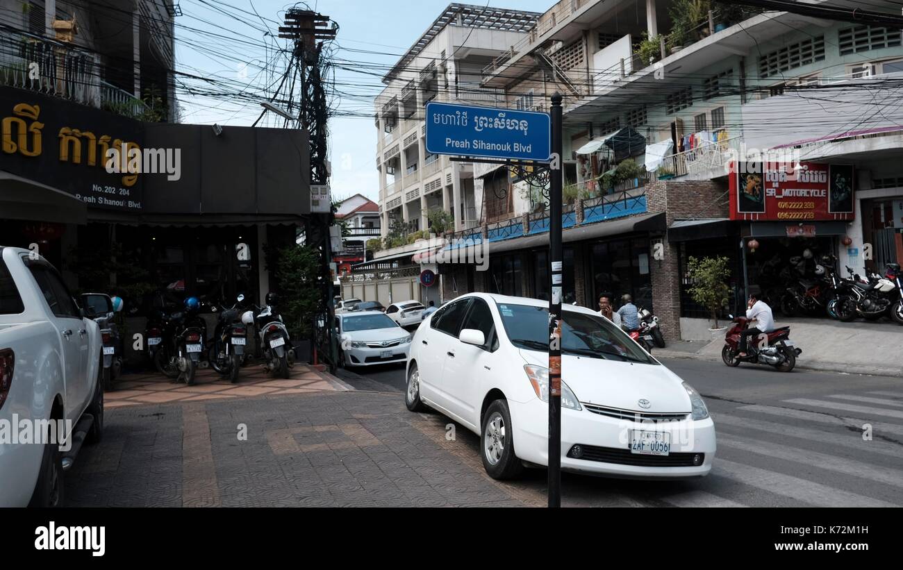 Street Corner Road Signs in Phnom Penh Cambodia auto parked on curb ...
