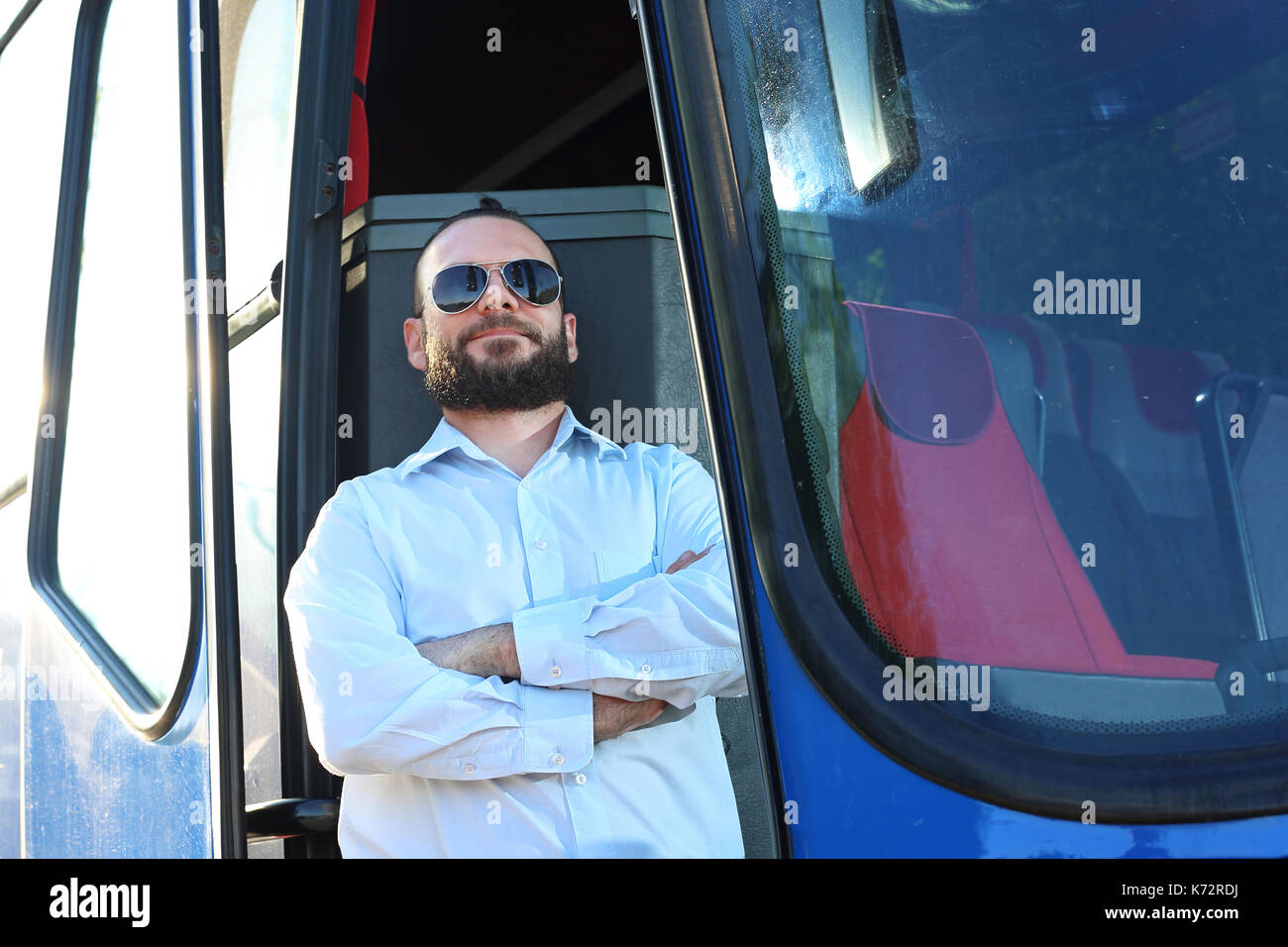 Bus driver. The driver of the bus shuttle. Driver. Public bus driver ...