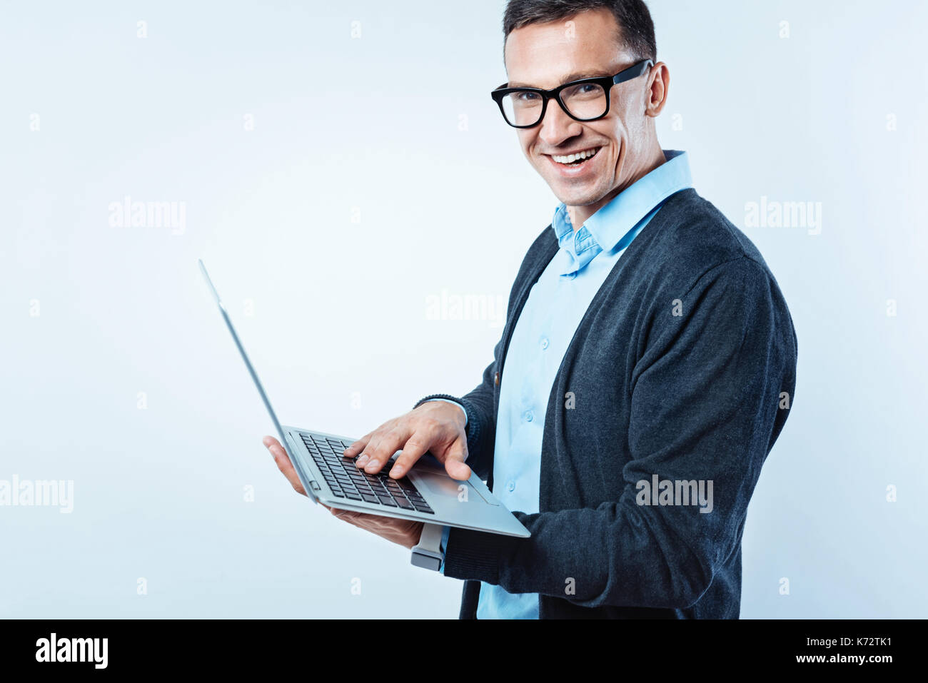 Posing with laptop hi-res stock photography and images - Alamy