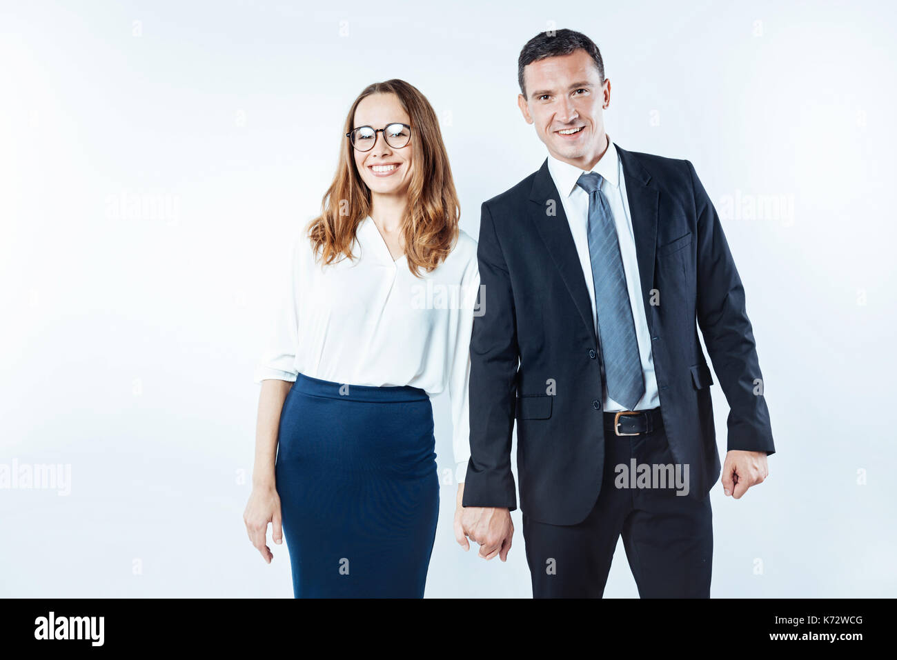 Friendly man glasses holding hi-res stock photography and images - Alamy