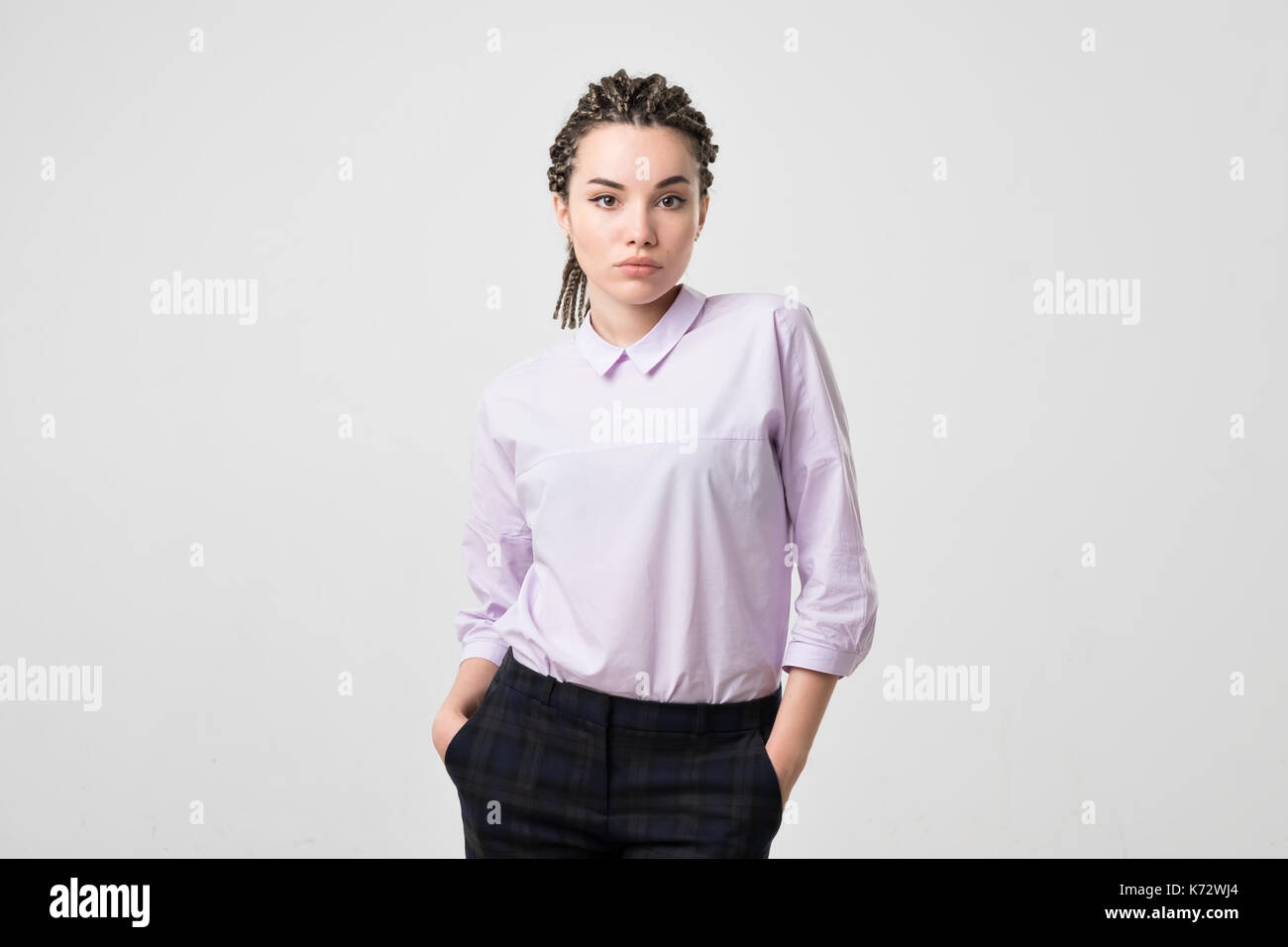 Isolated woman standing hi-res stock photography and images - Alamy