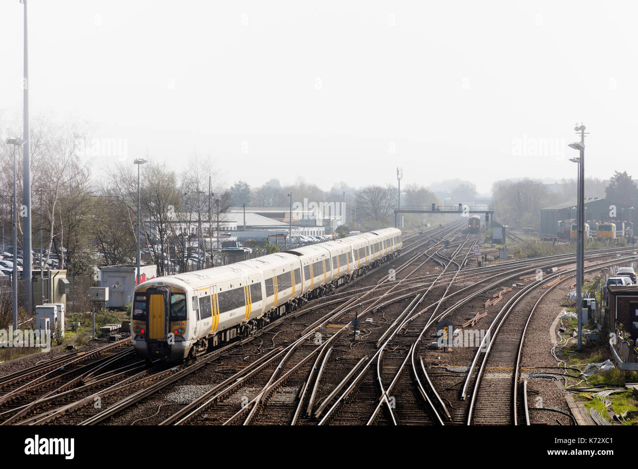 Trains enter and leave Tonbridge station across a series of points on a ...