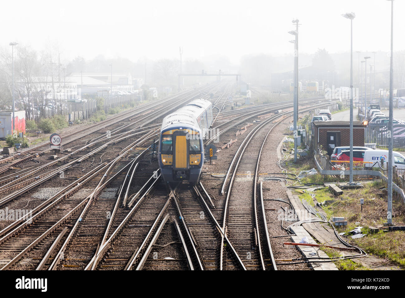 Trains enter and leave Tonbridge station across a series of points on a ...