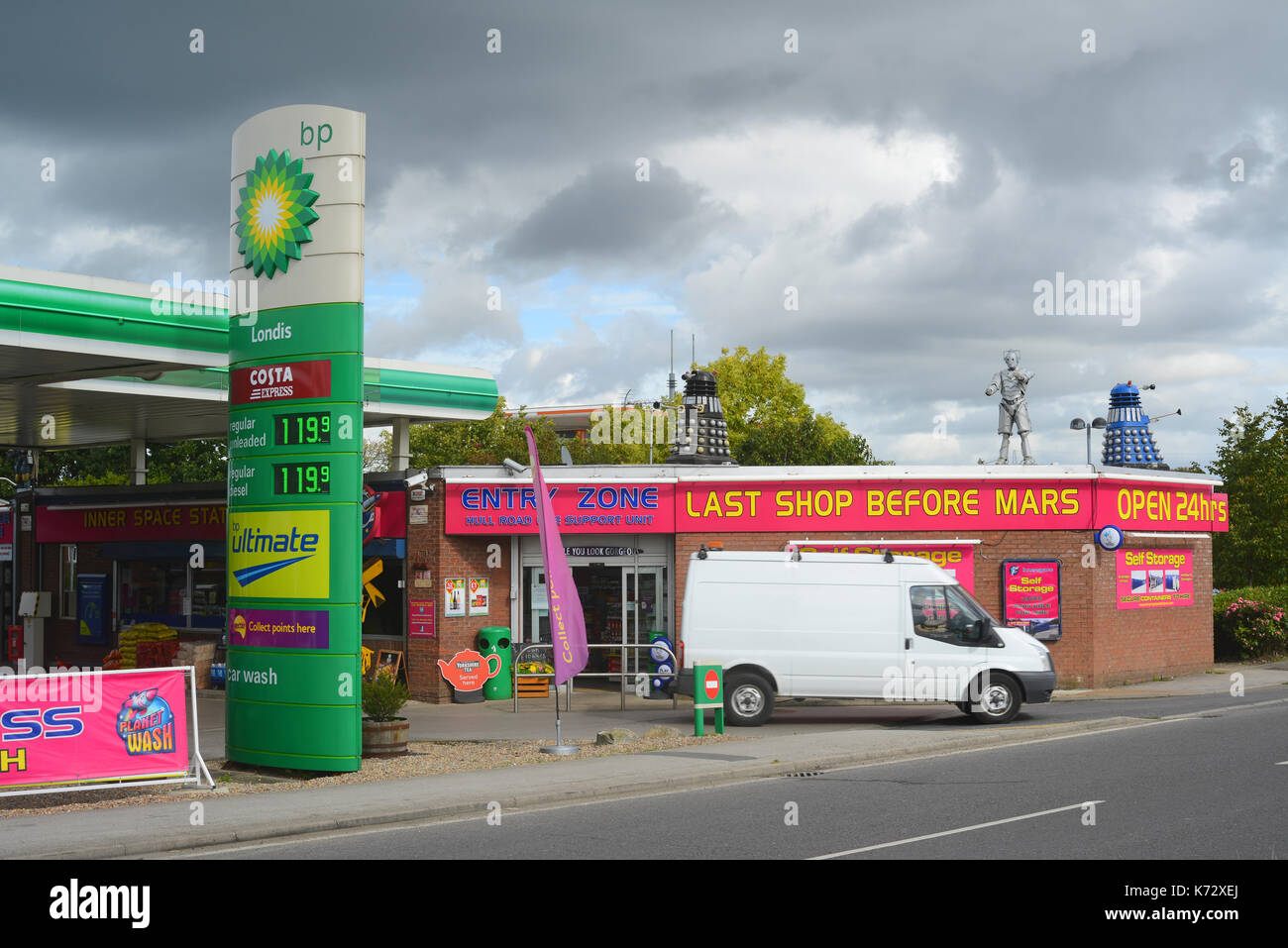 funny sign last shop before mars at roadside garage with daleks and ...