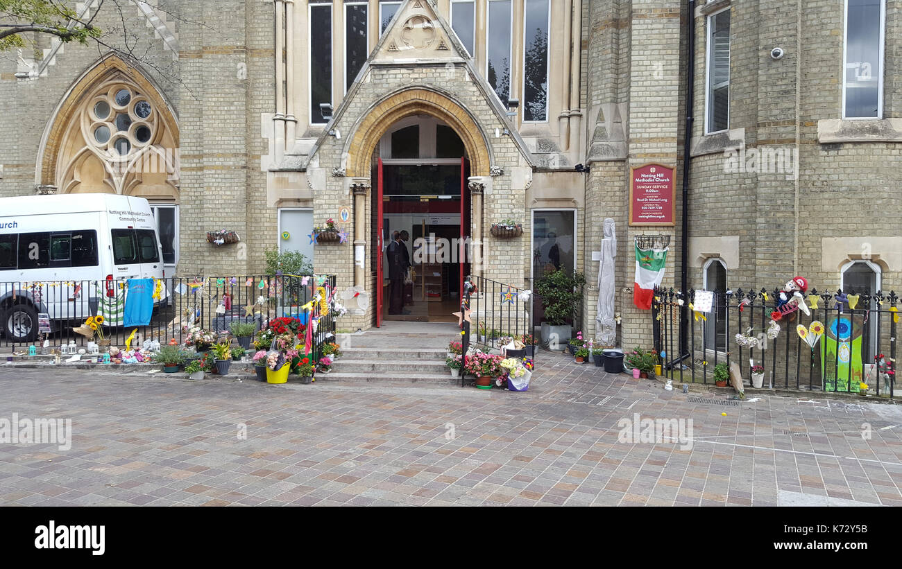Tributes left outside Notting Hill Methodist Church in Notting Hill ...