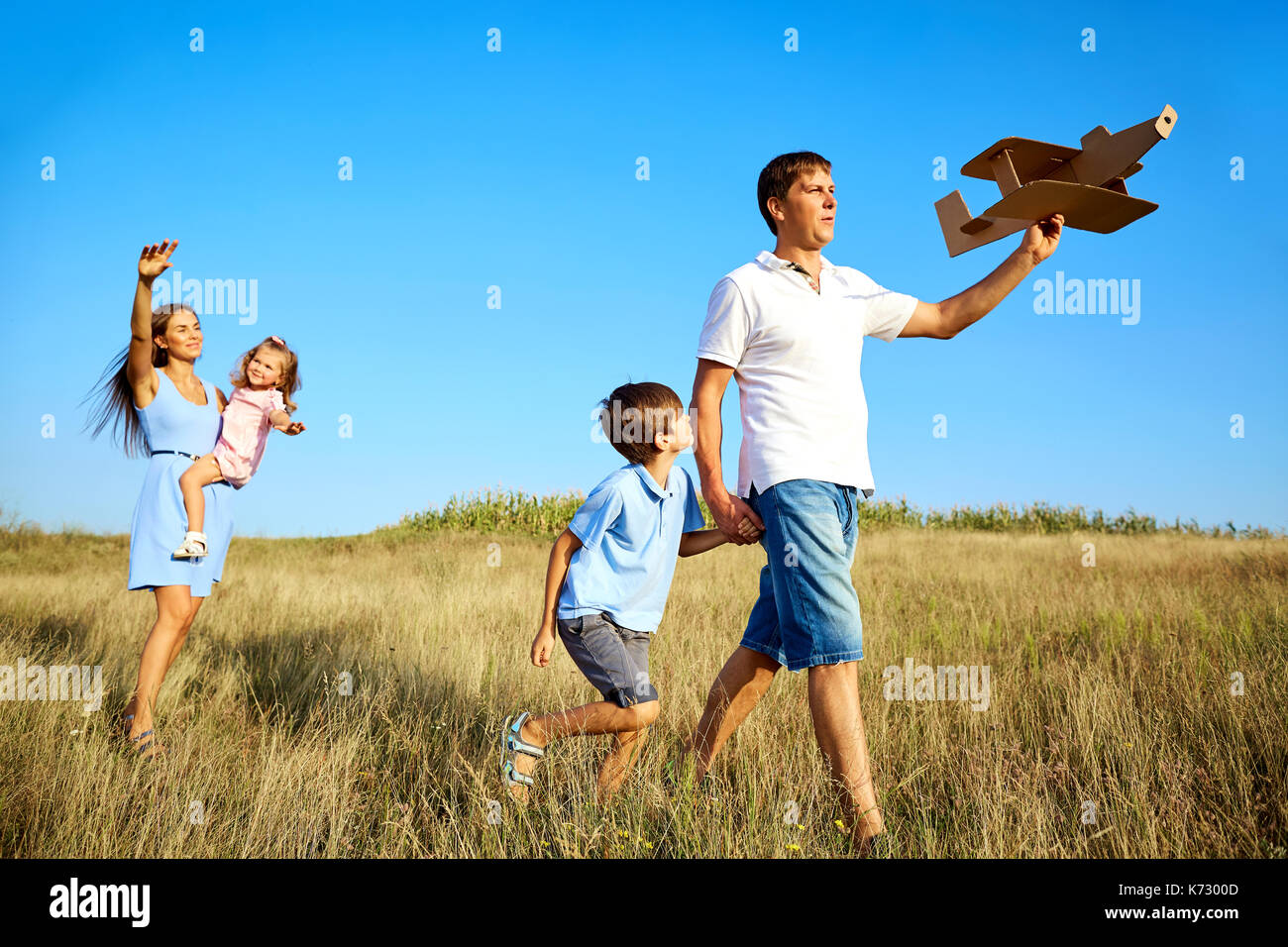 Happy family walks nature hi-res stock photography and images - Alamy
