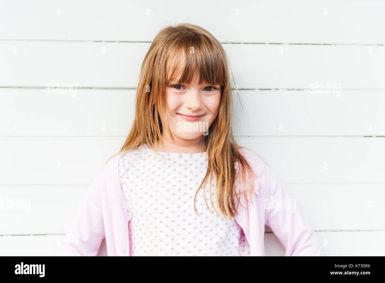 Cute little girl with long hair Stock Photo - Alamy