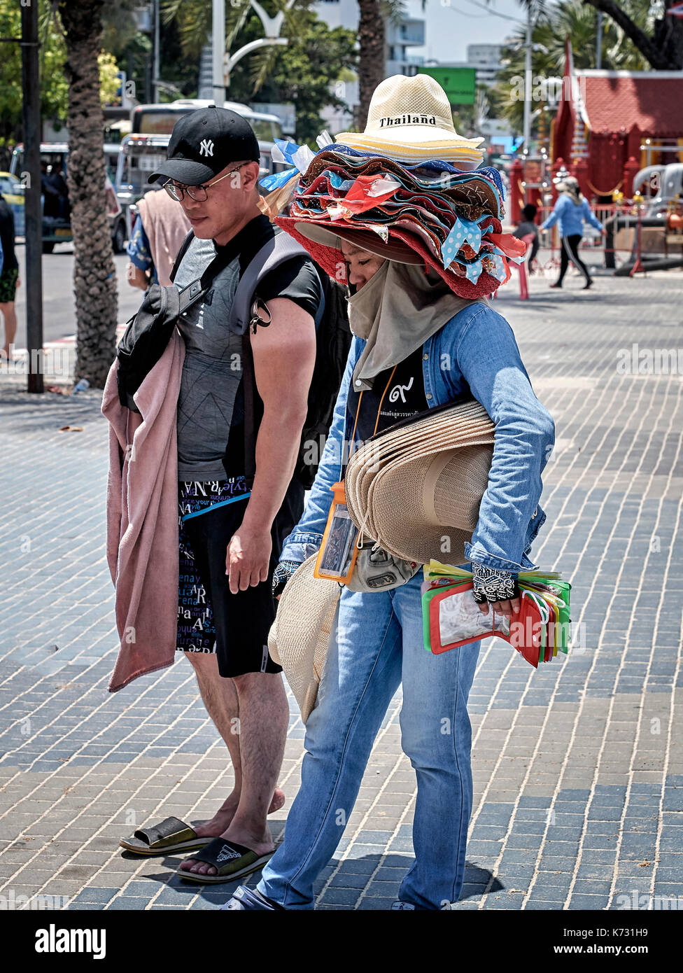 Female street vendor selling sun hats. Pattaya Thailand Southeast Asia ...