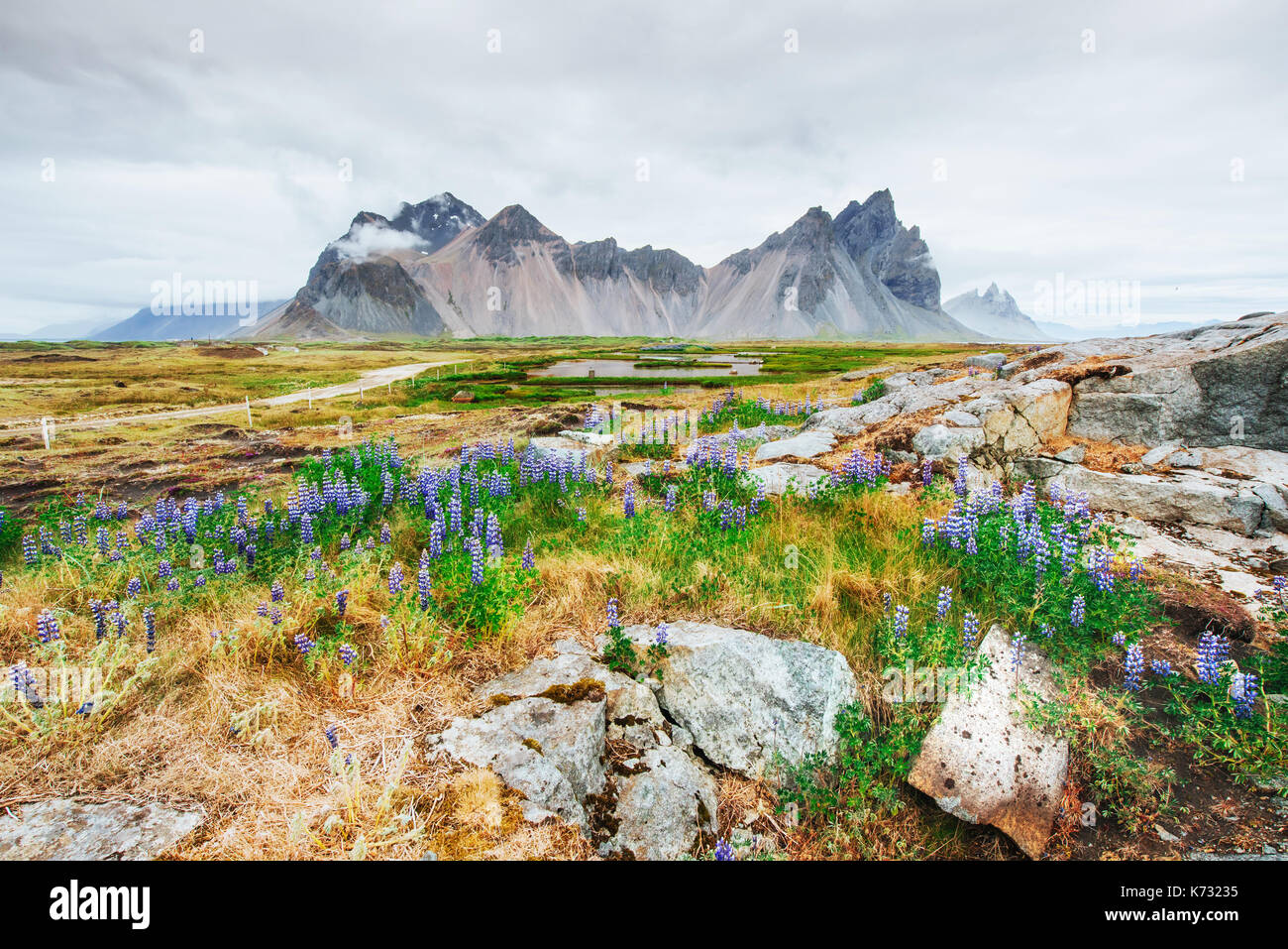 Gentle slopes of snow-capped mountains and glaciers. Wonderful Iceland ...