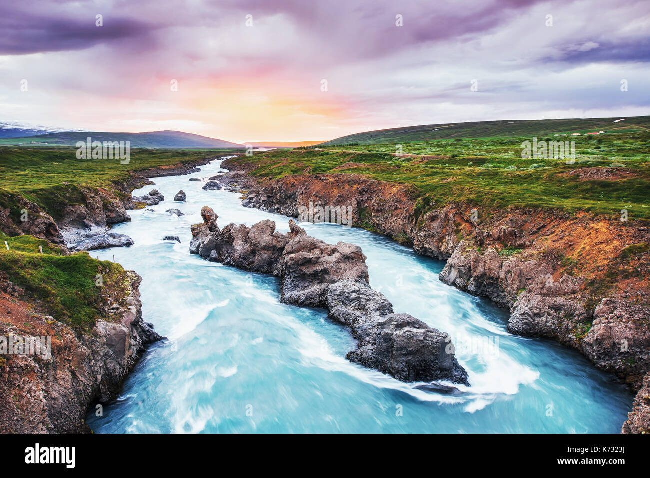 Gentle slopes of snow-capped mountains and glaciers. Wonderful Iceland ...