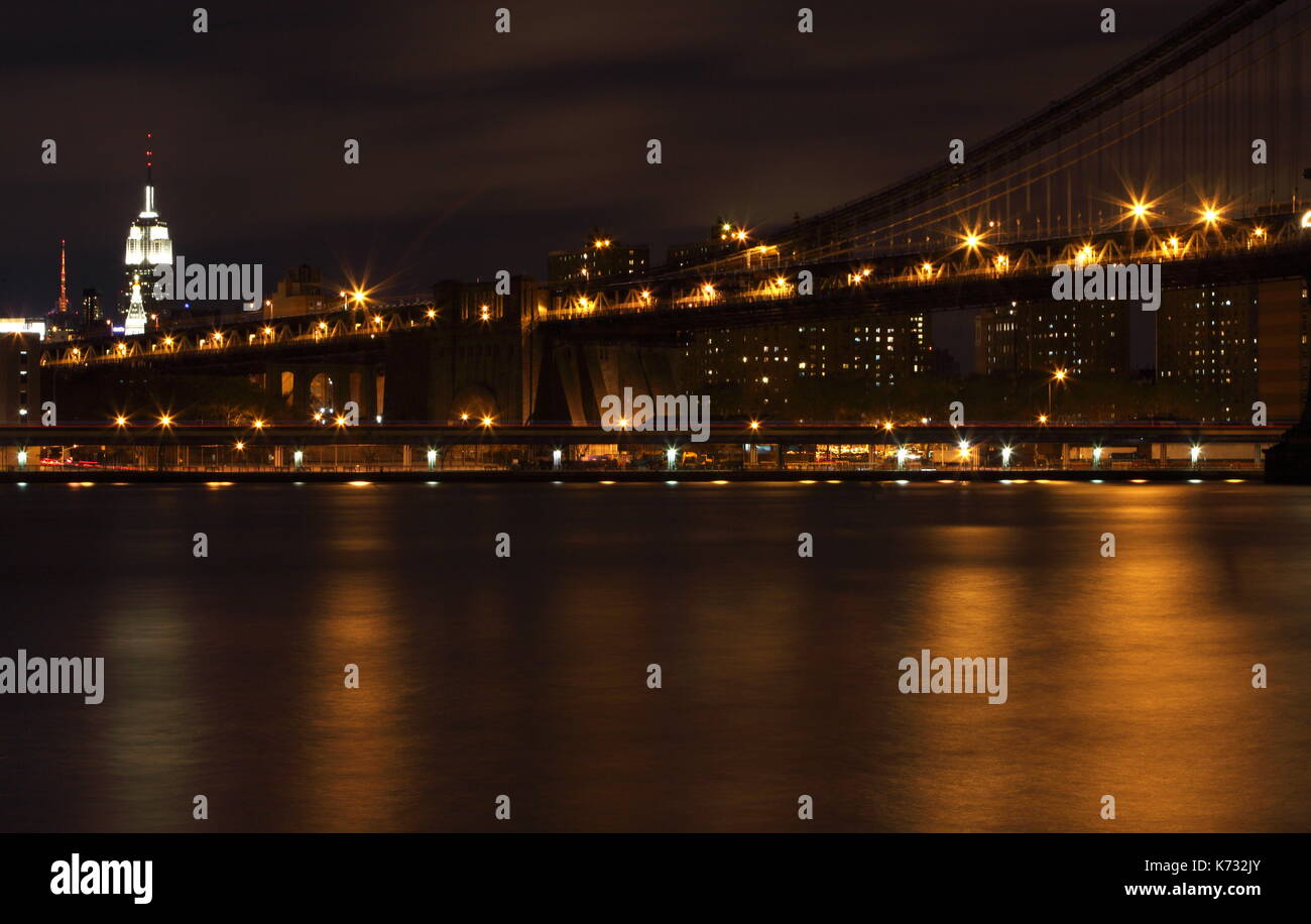 The Manhattan bridge is half-lit experiencing a partial power loss ...