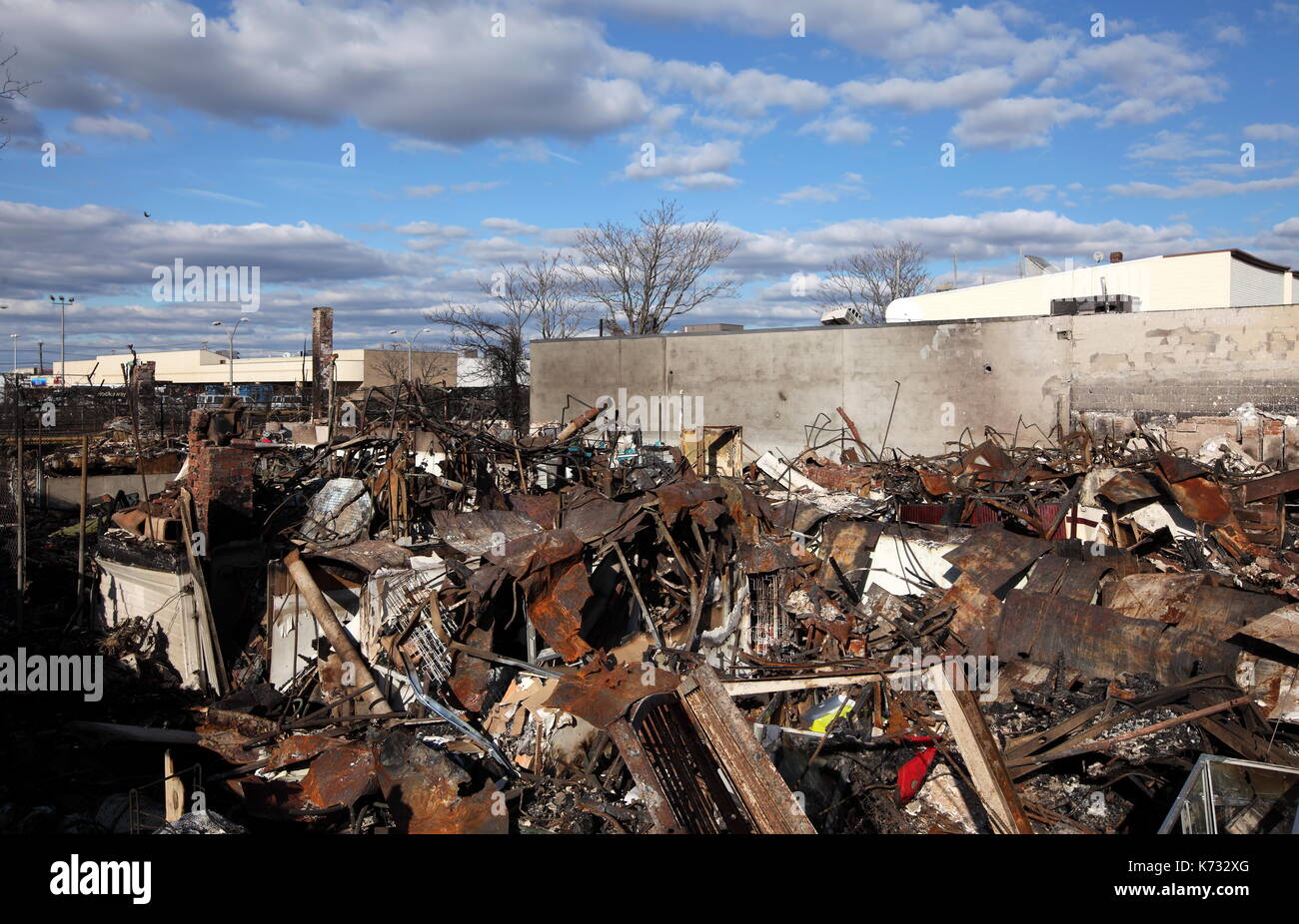 Burned-out buildings and debris in the aftermath of Hurricane Sandy in ...