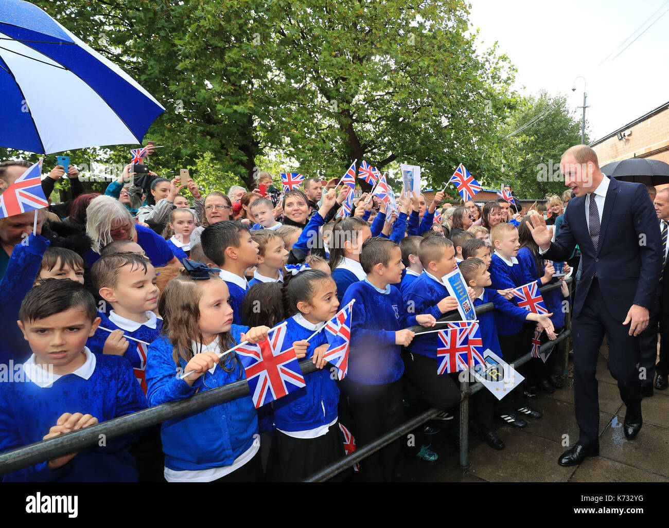 The Duke of Cambridge meets school children as he arrives for a visit ...