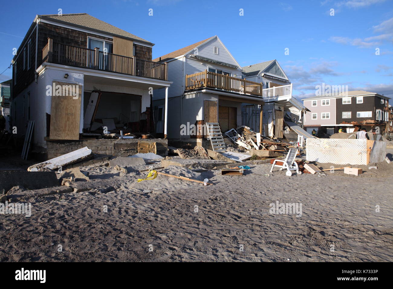 Beachfront homes lie in ruin in the aftermath of Hurricane Sandy in the ...