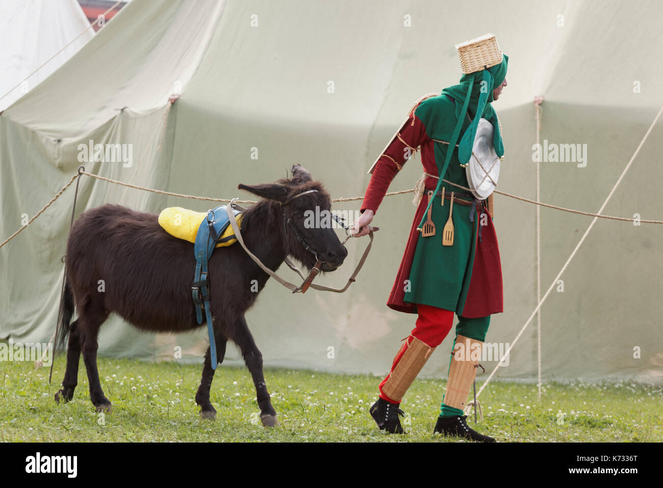 St. Petersburg, Russia - July 8, 2017: Buffoon with a donkey imitating ...