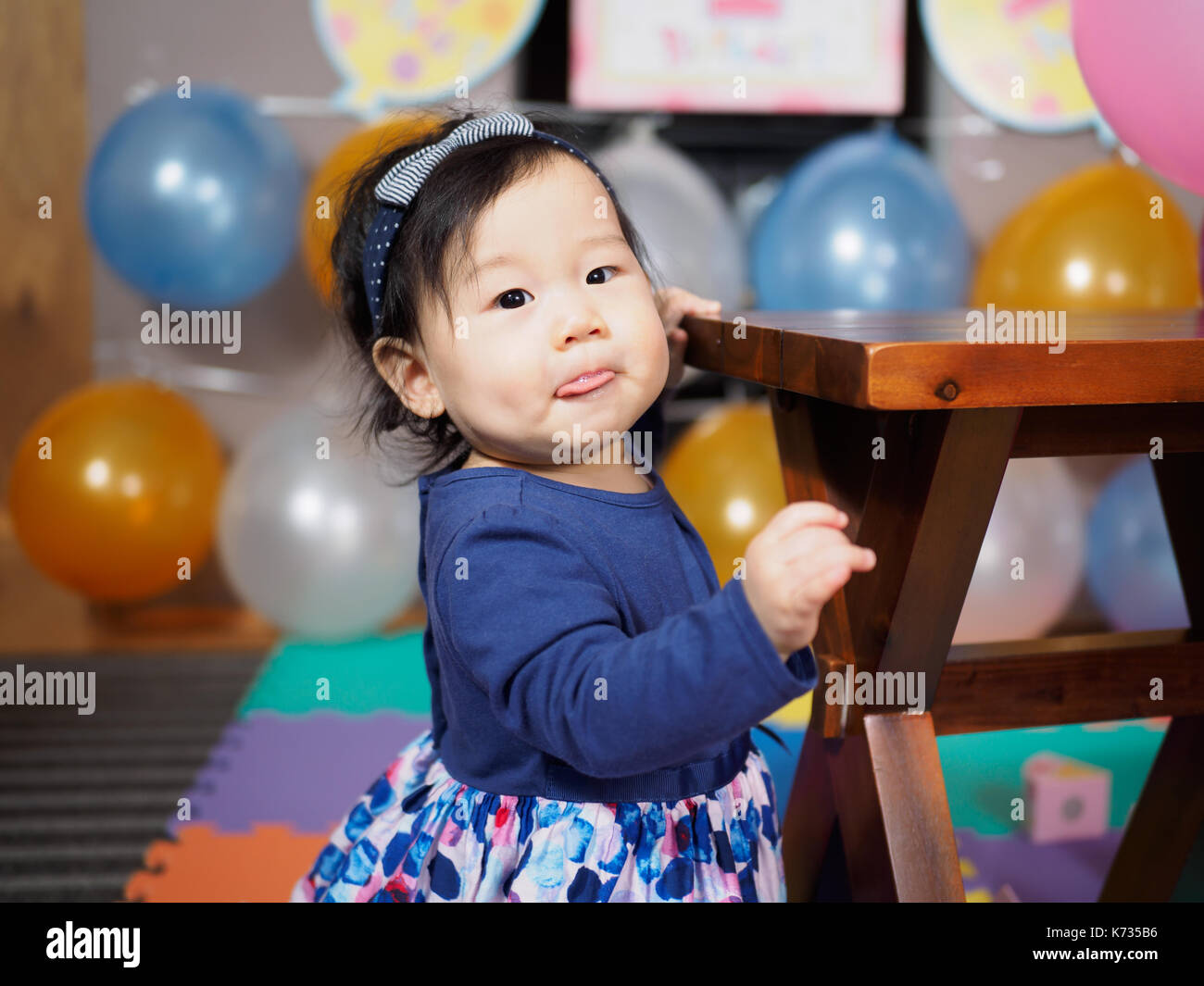 Asian family celebrating baby birthday hi-res stock photography and ...