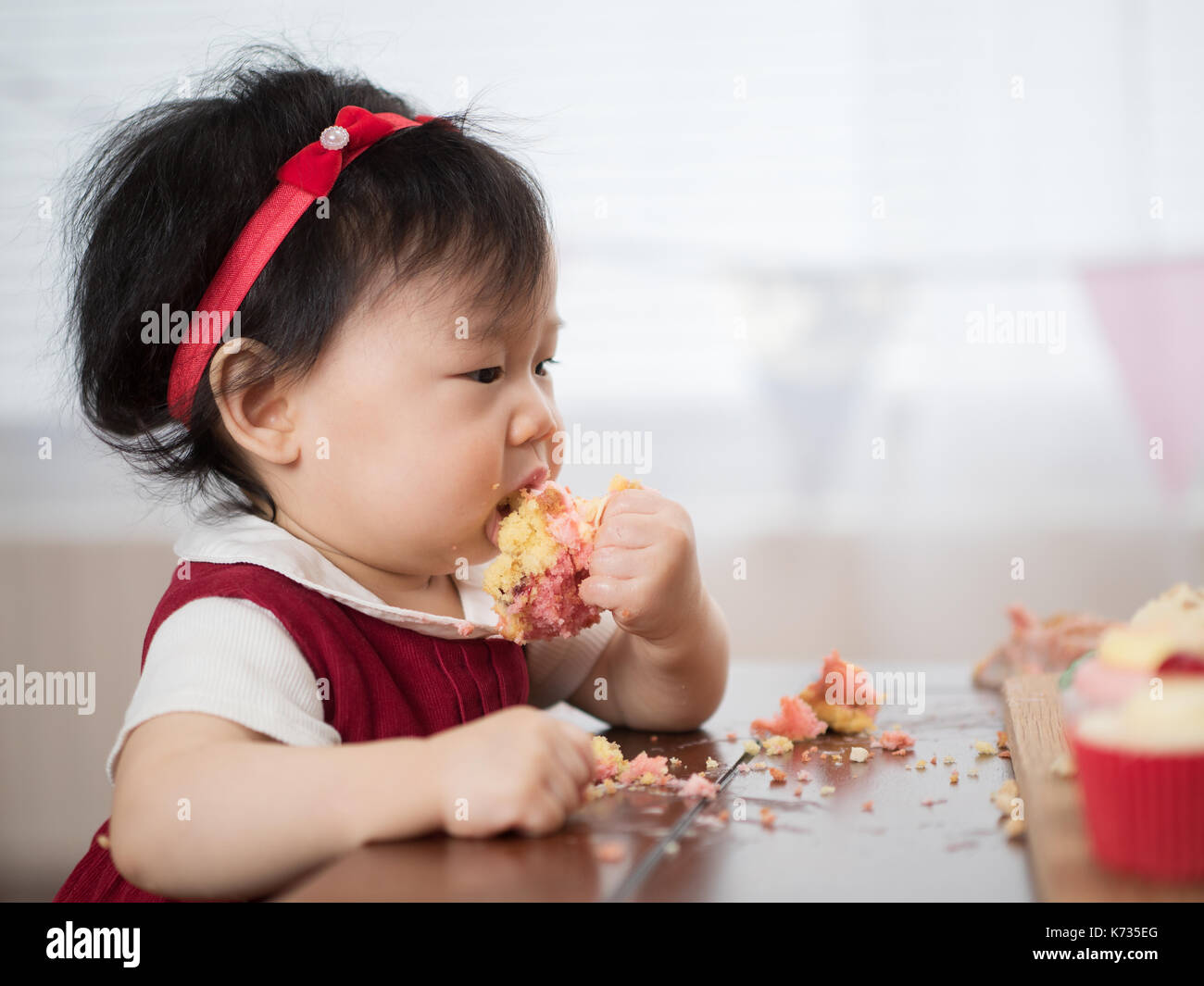 Baby Eating Cupcake