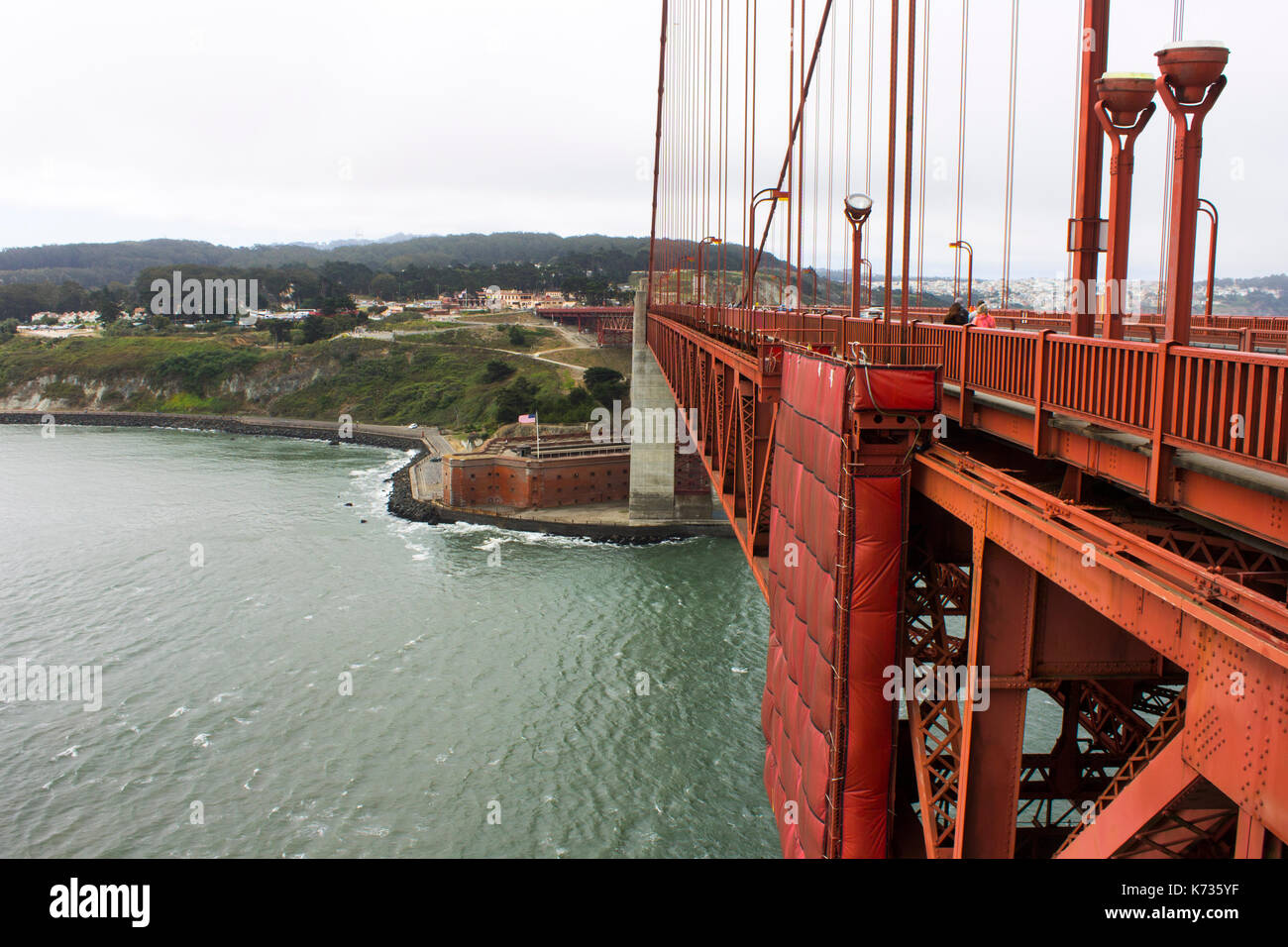 The Golden Gate Bridge, a painted red suspension bridge spanning the ...