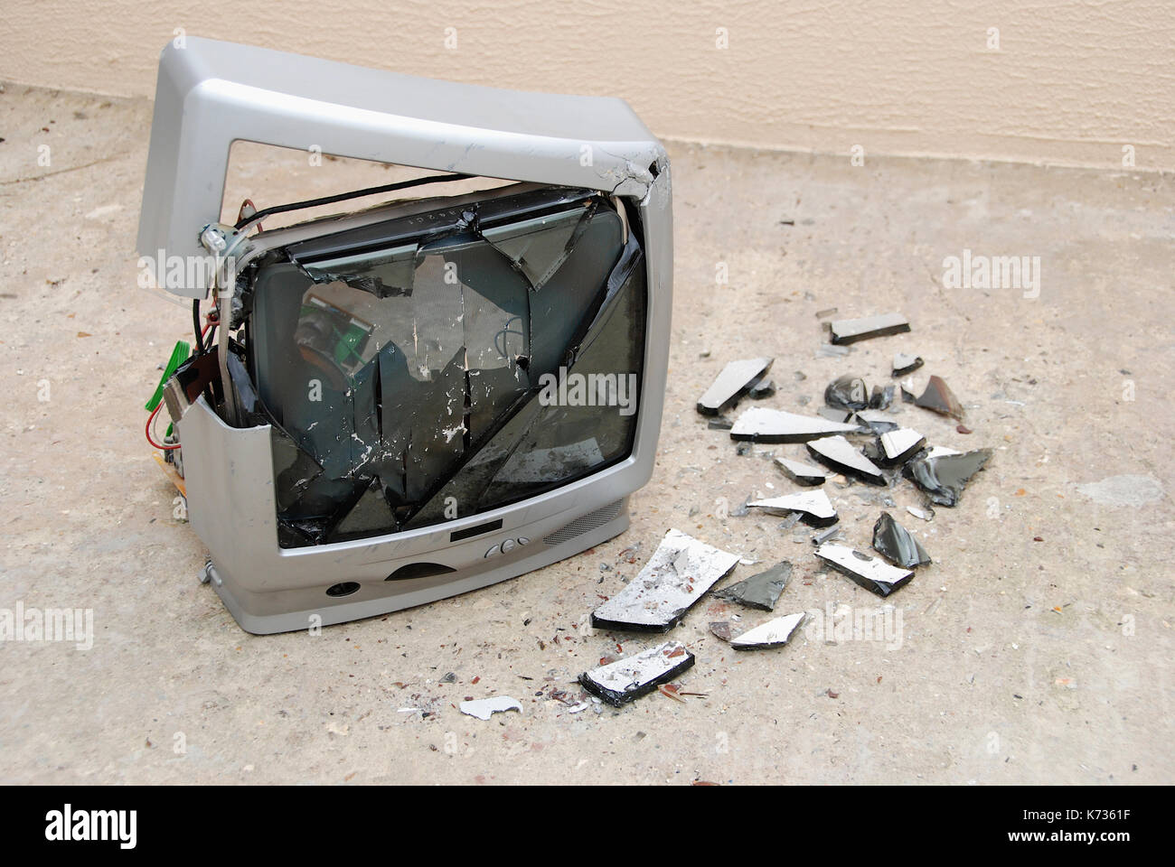 Smashed TV and pieces Stock Photo - Alamy