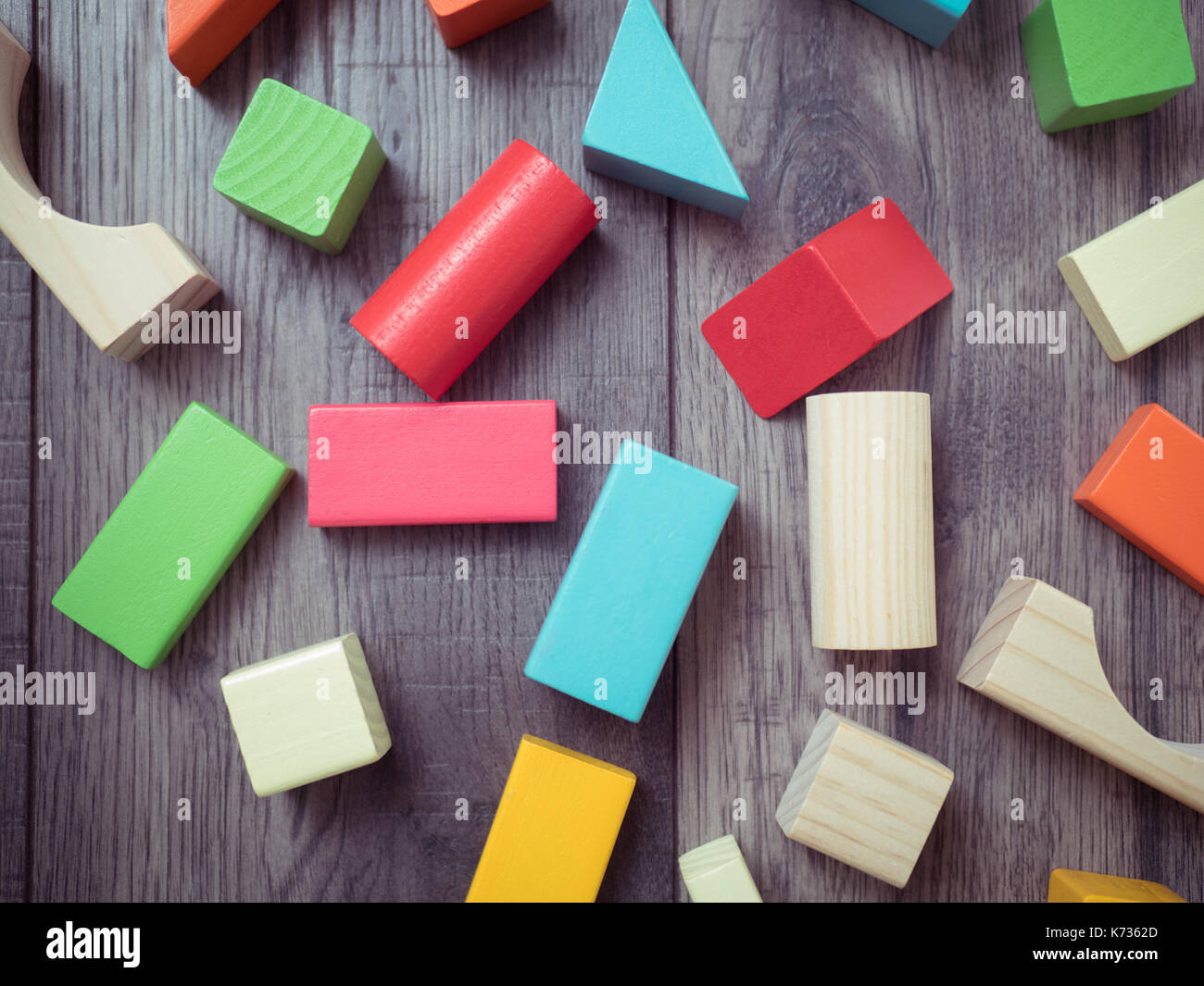 Wooden toy blocks background Stock Photo - Alamy
