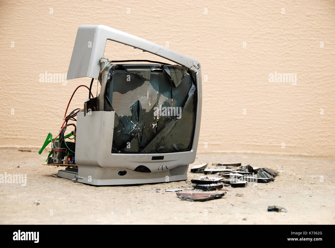 Smashed TV and pieces Stock Photo - Alamy