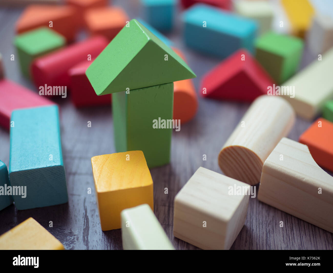 Wooden toy blocks background Stock Photo - Alamy